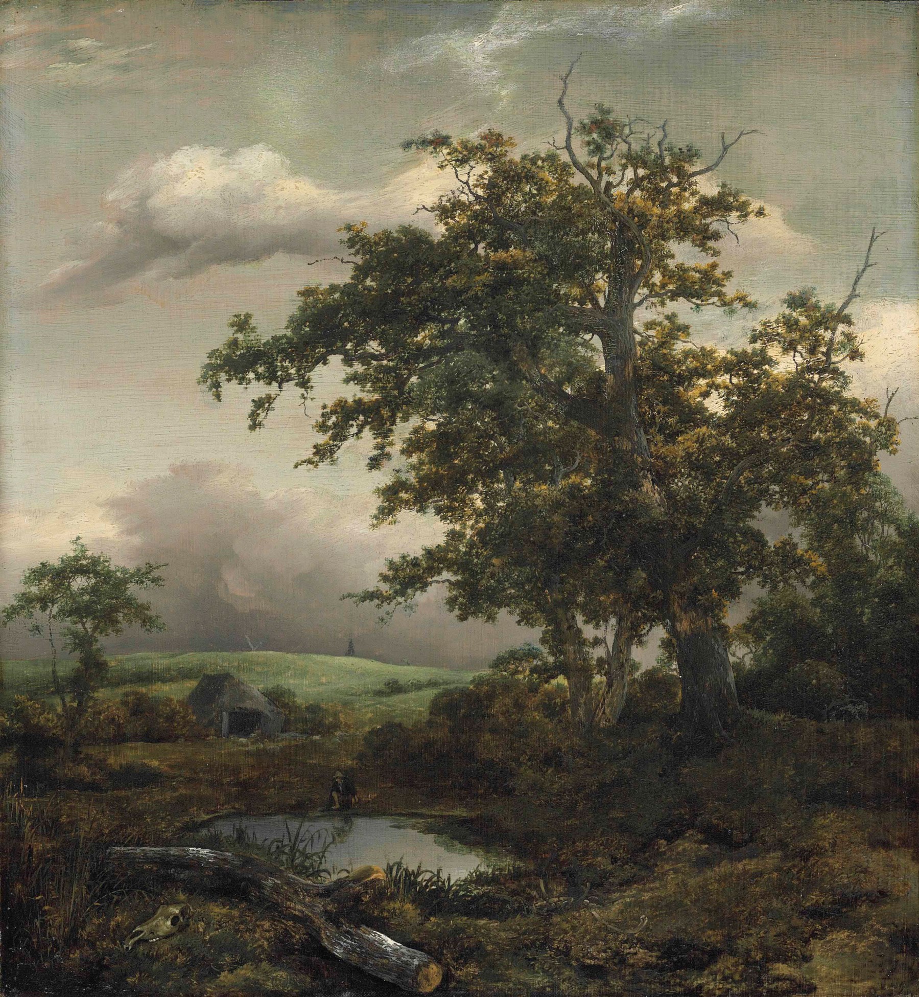 Jacob van Ruisdael (Haarlem 1628/9-1682 Amsterdam), A wooded landscape ...