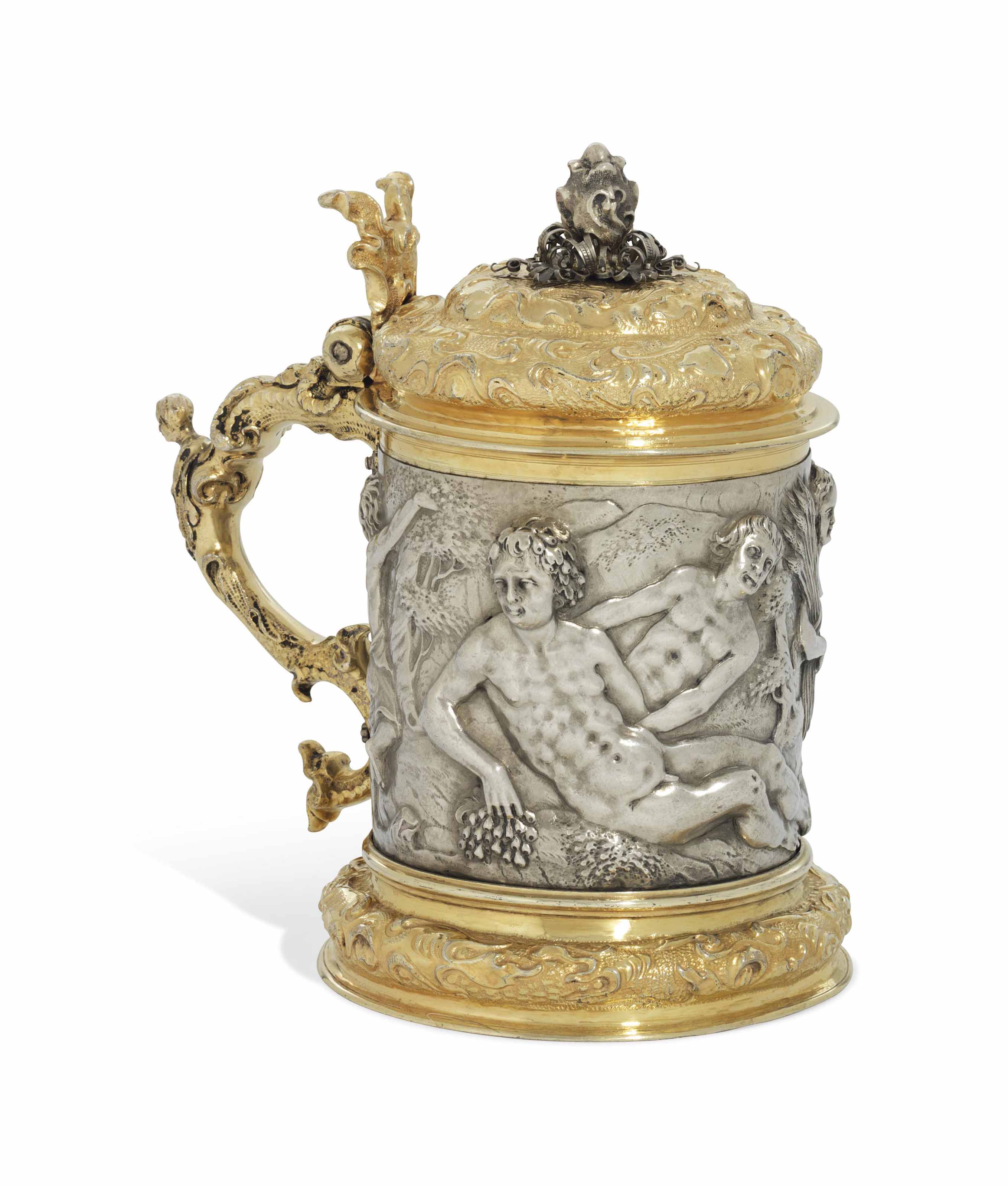 A GERMAN PARCEL-GILT SILVER TANKARD