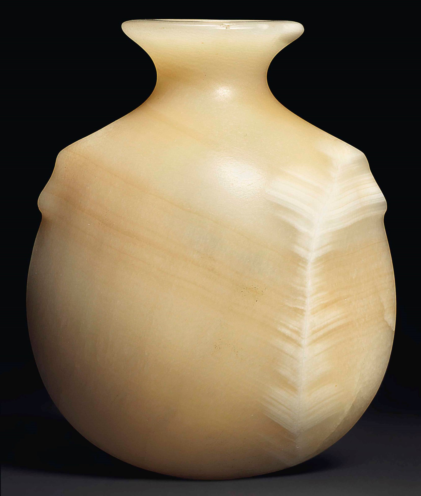 AN EGYPTIAN ALABASTER PILGRIM FLASK, NEW KINGDOM, 18TH-19TH DYNASTY ...