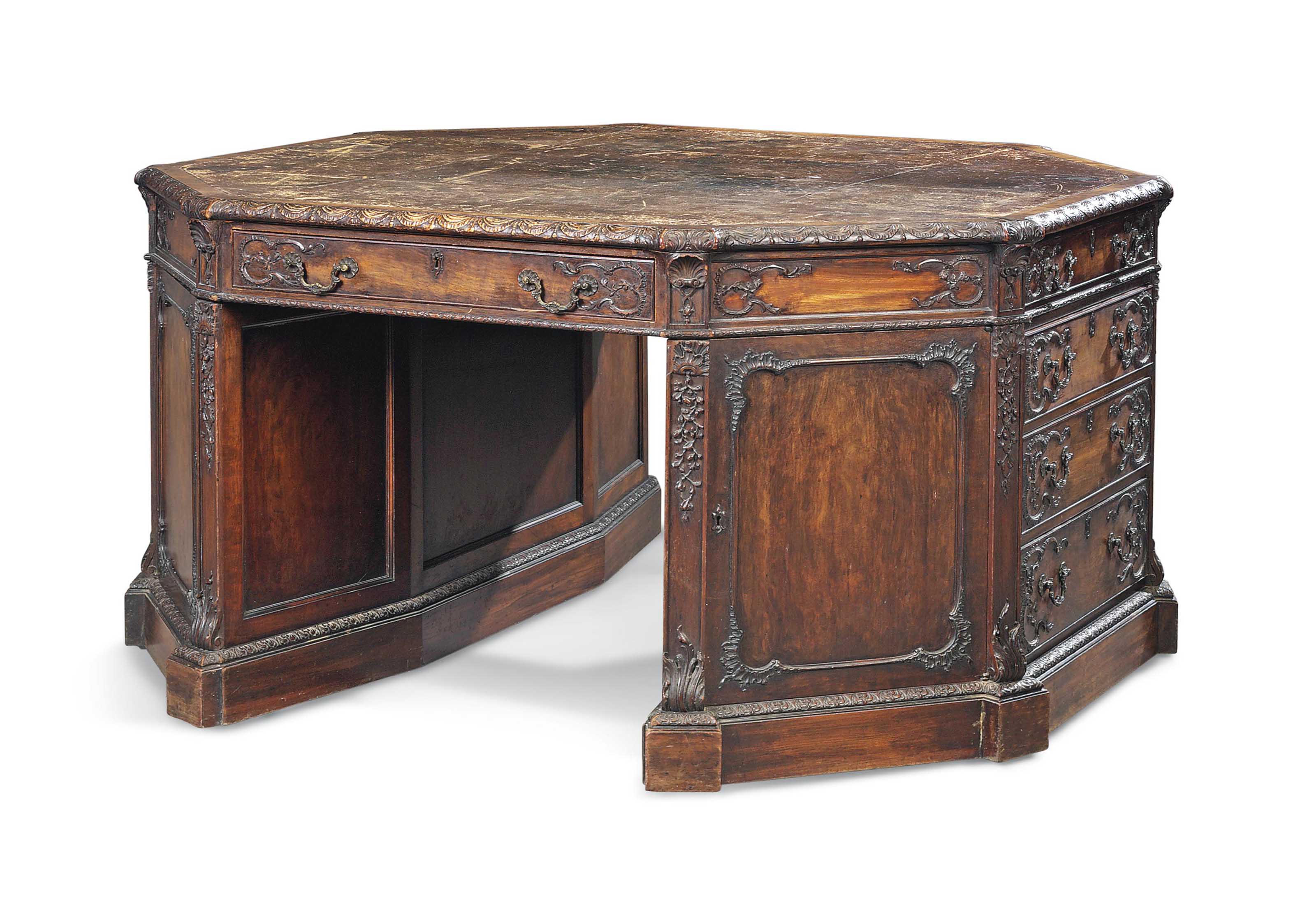 A MAHOGANY OCTAGONAL PARTNERS' DESK