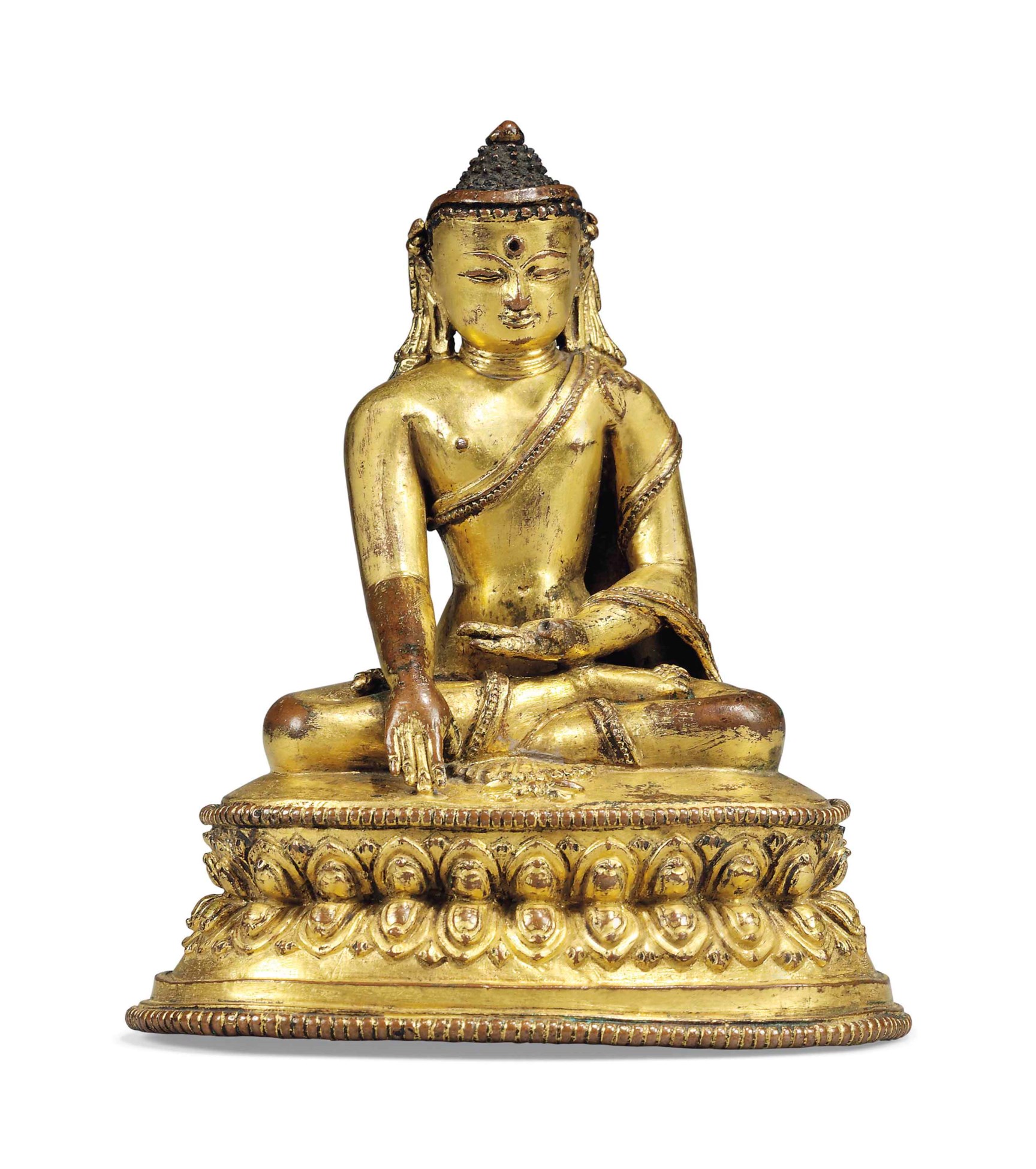 A GILT-BRONZE FIGURE OF AKSHOBHYA, TIBET, LATE 15TH CENTURY | Christie's