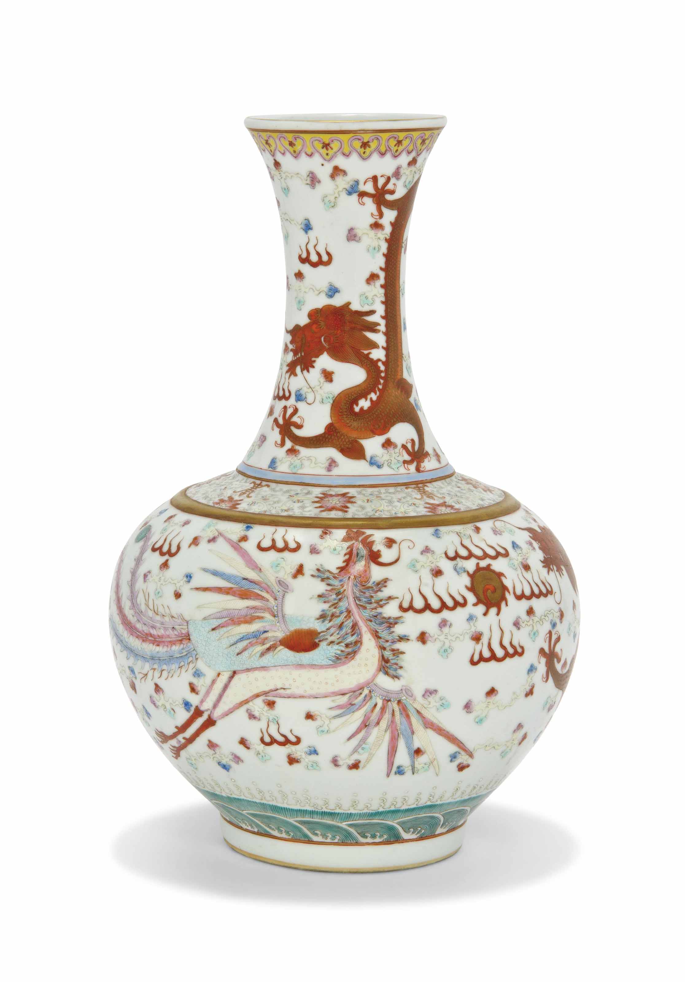 A CHINESE FAMILLE ROSE 'DRAGON AND PHOENIX' BOTTLE VASE