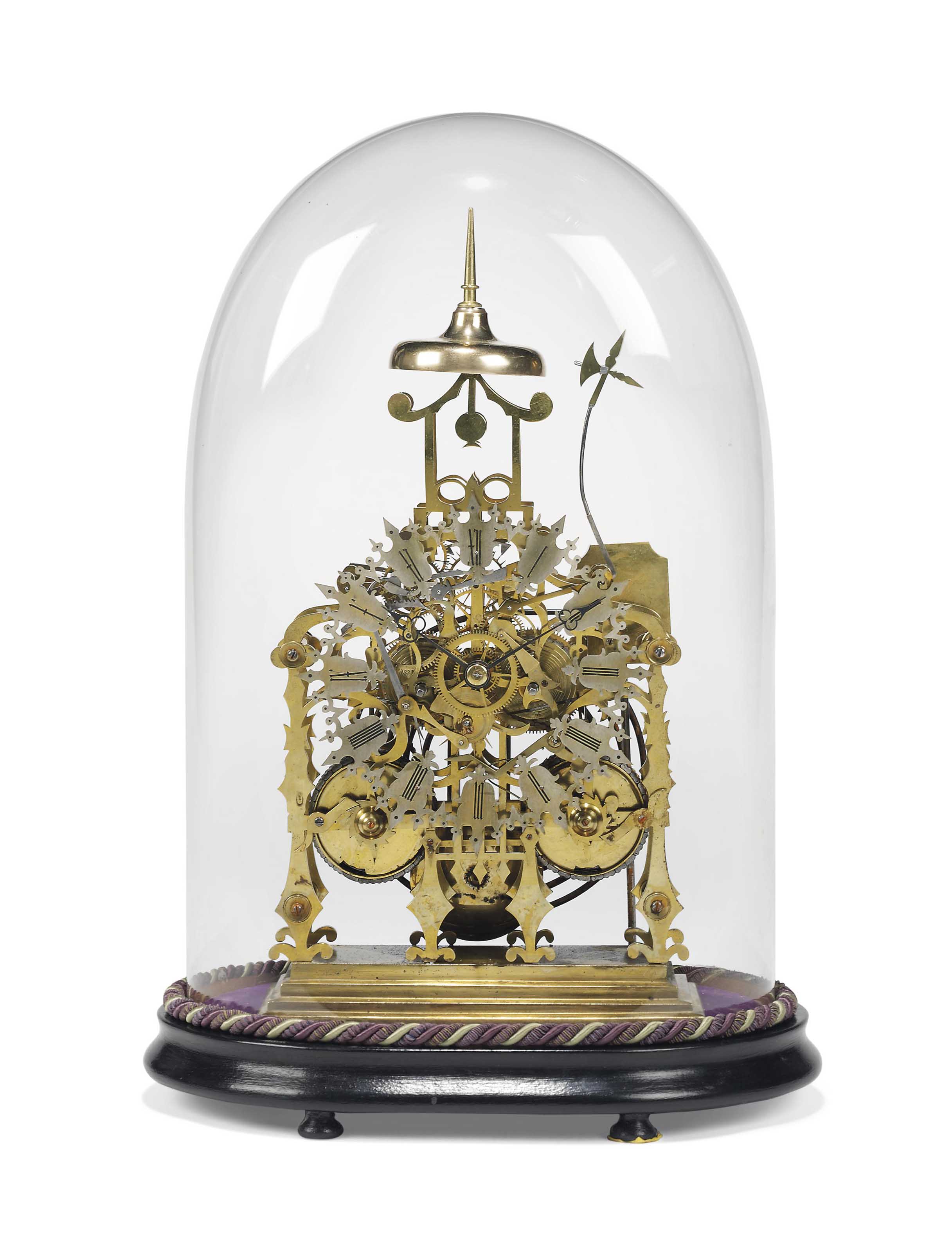 A VICTORIAN BRASS STRIKING SKELETON CLOCK