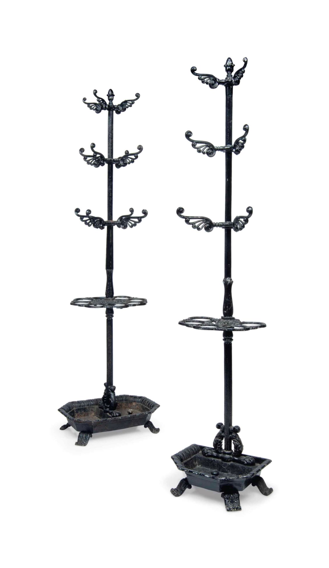 TWO MATCHING VICTORIAN CAST-IRON, BLACK-PAINTED HALL-STANDS, LATE 19TH ...