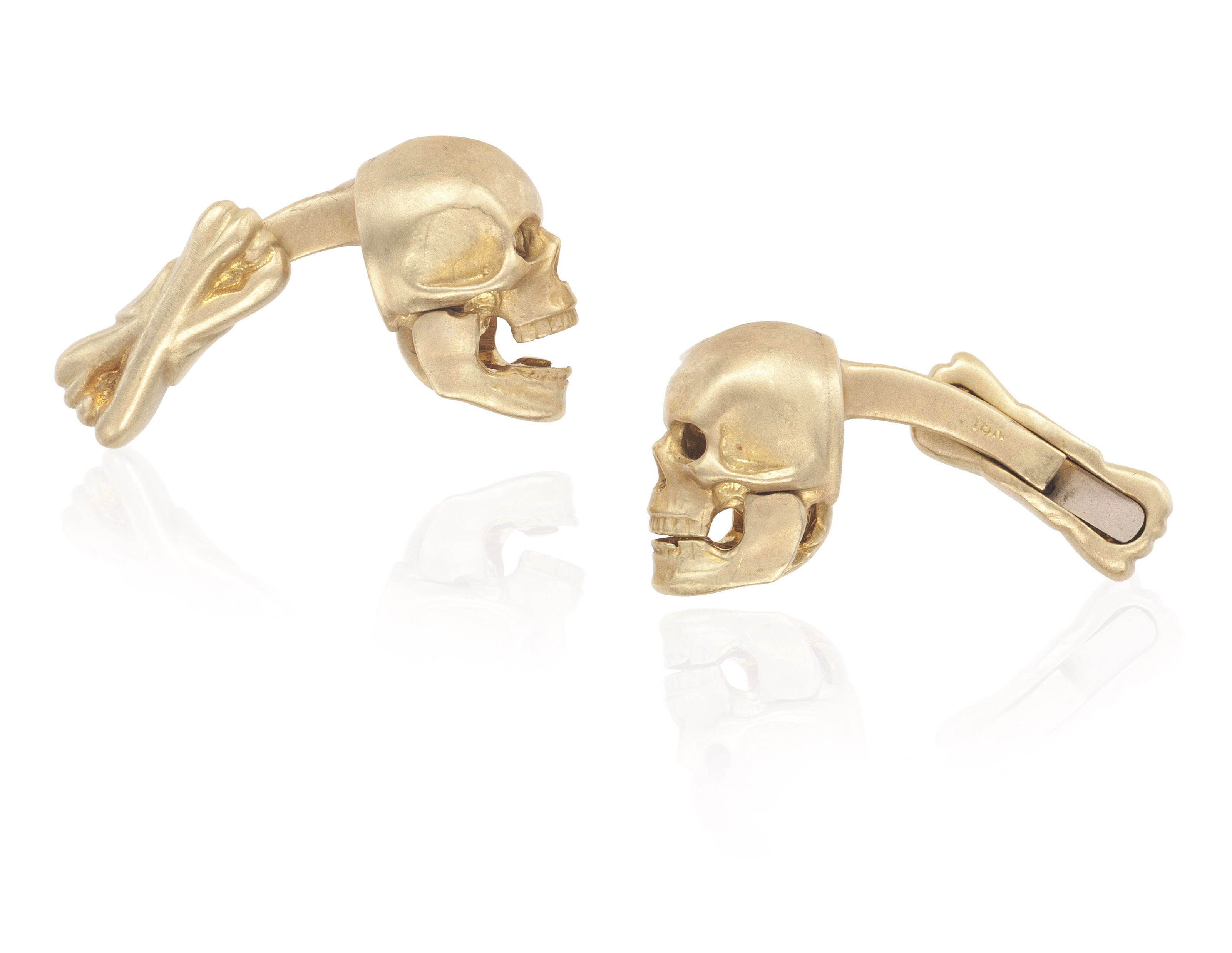 GOLD AND DIAMOND SKULL CUFFLINKS, | Christie’s