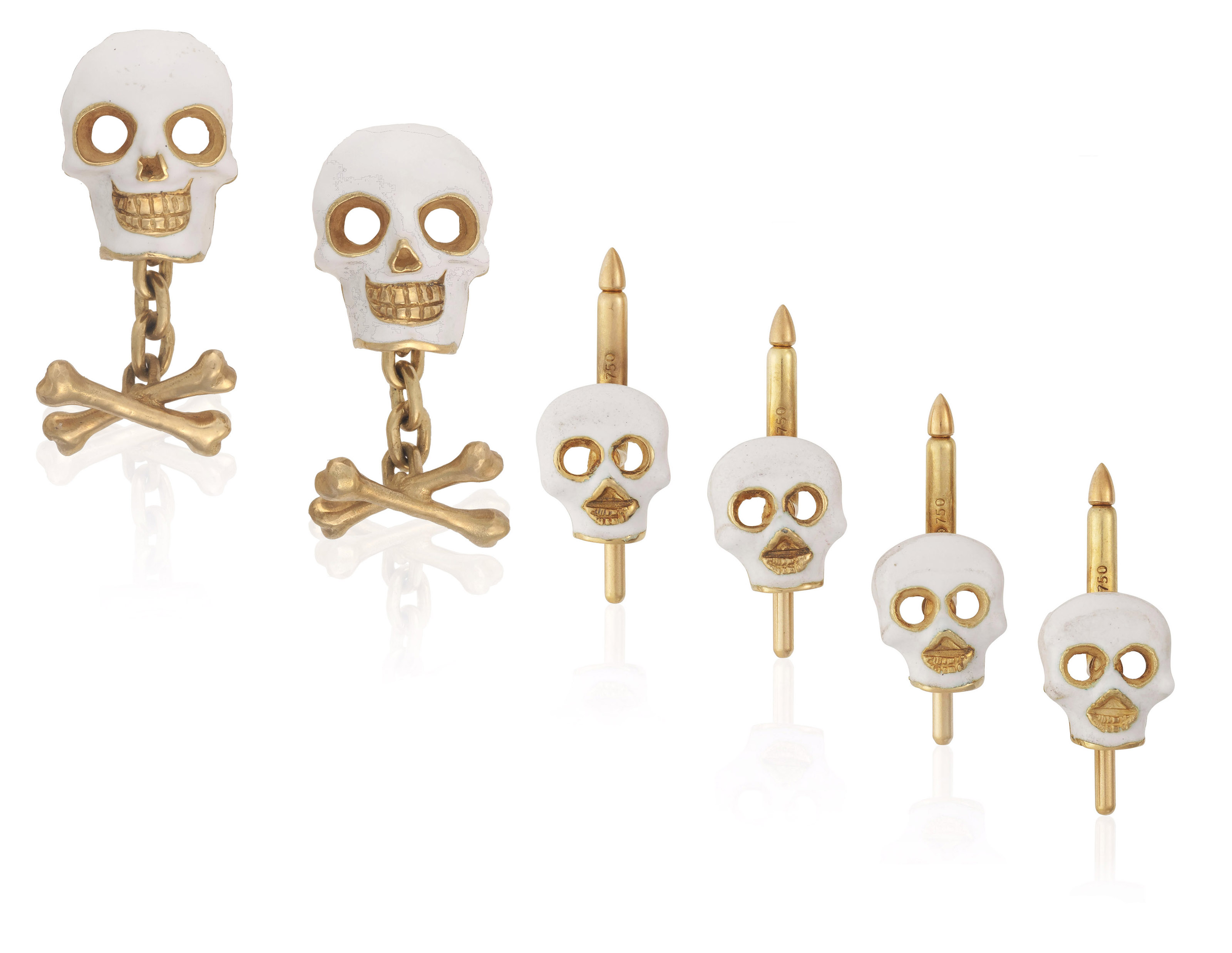 ENAMEL SKULL AND CROSS BONE DRESS SET, | Christie’s