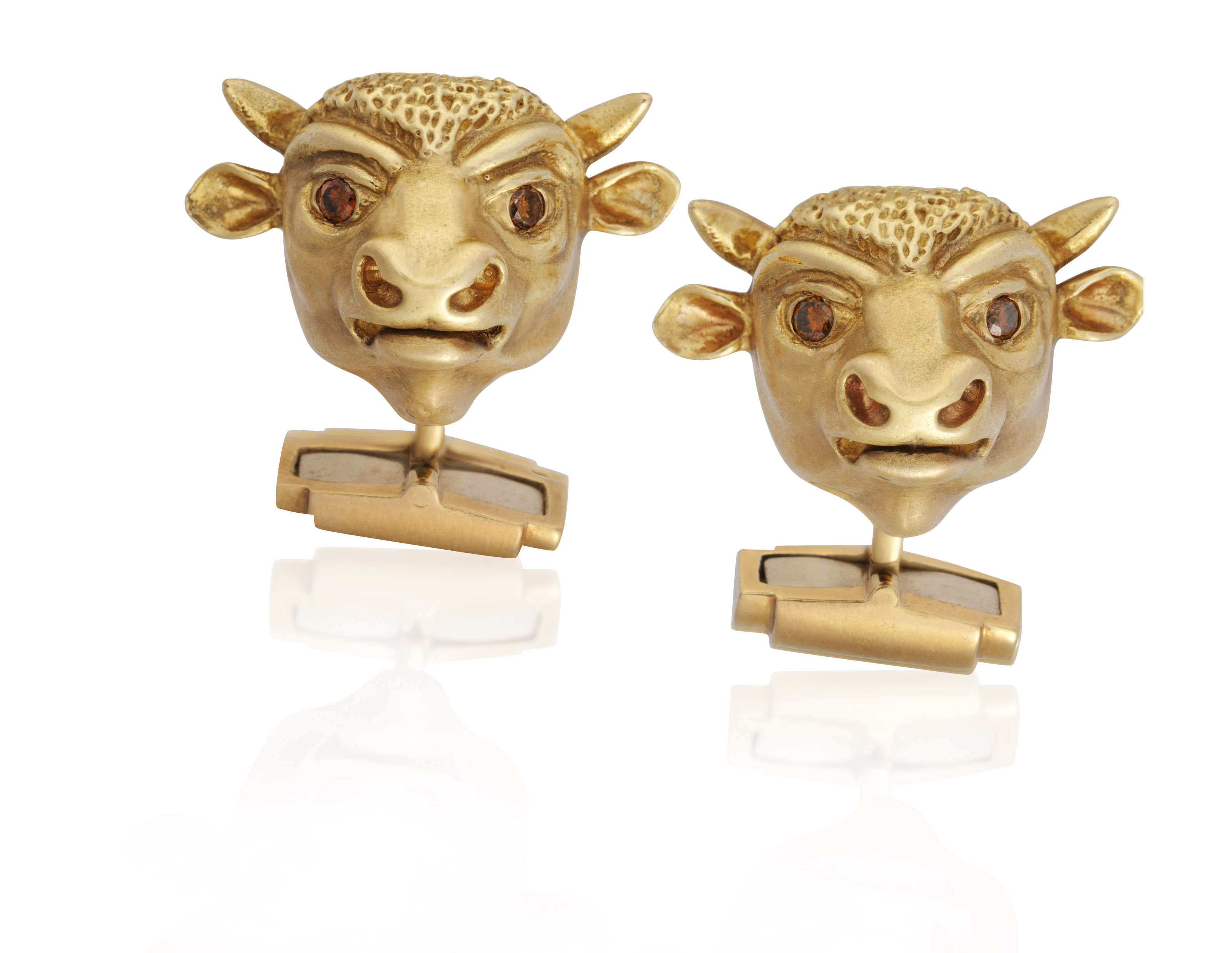 COLORED DIAMOND AND GOLD BULL CUFFLINKS, | Christie’s