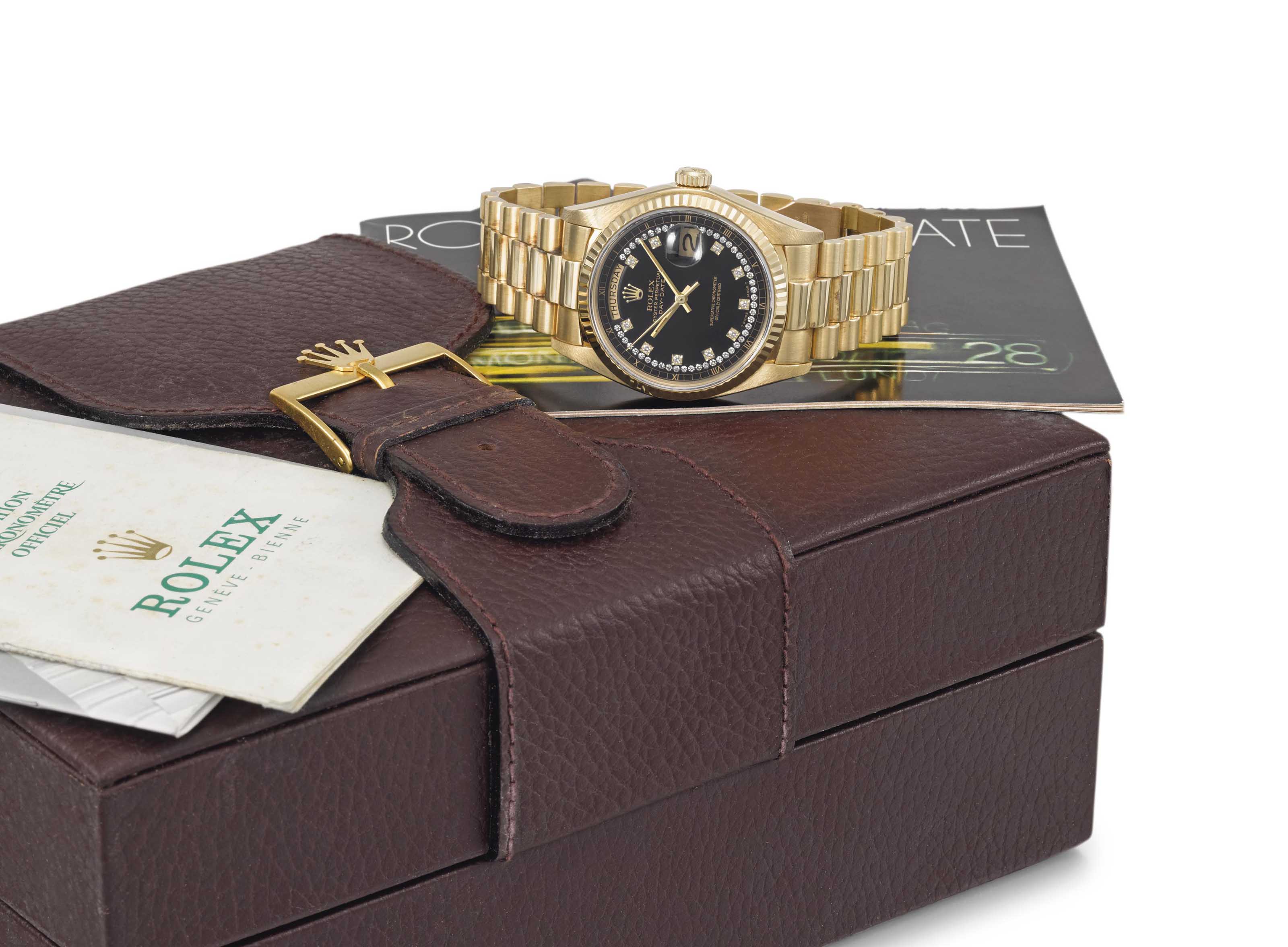 Rolex A rare and attractive 18K gold diamond-set automatic w ...