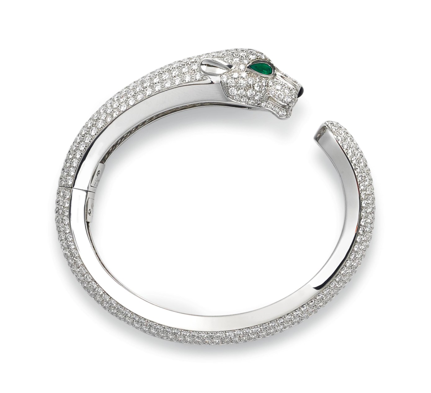 A DIAMOND, EMERALD AND ONYX PANTHER BANGLE, BY CARTIER | Christie's