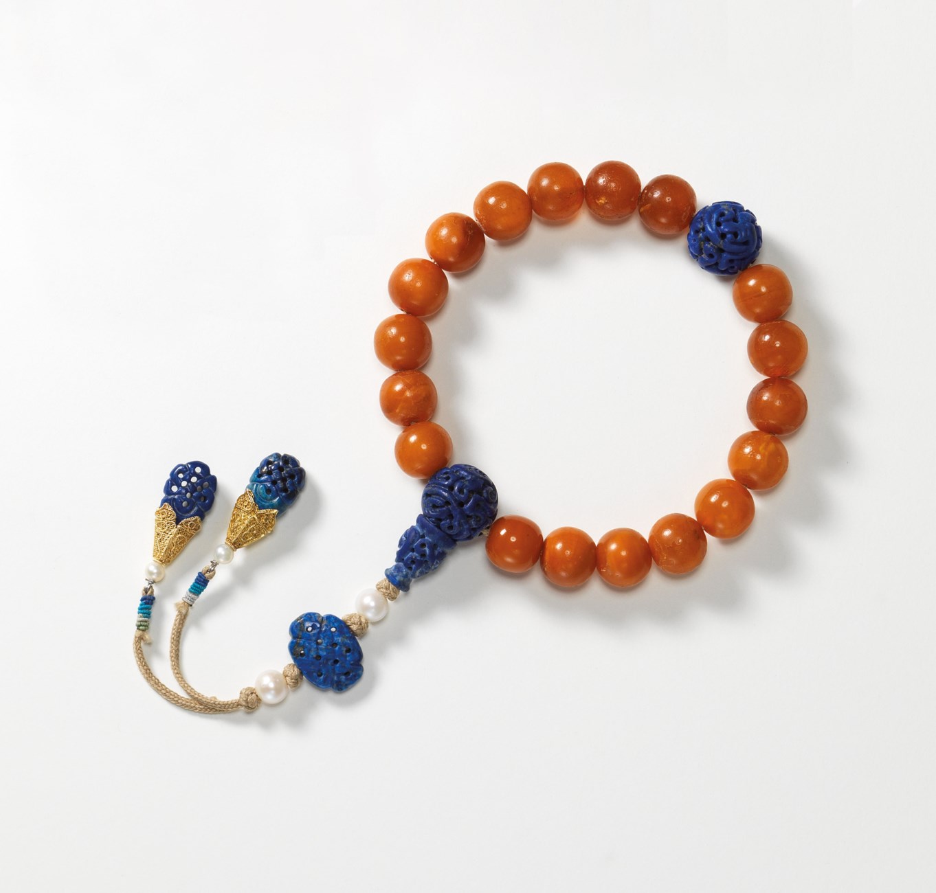 A STRING OF AMBER AND LAPIS LAZULI ROSARY BEADS, SHOUCHUAN, QING ...