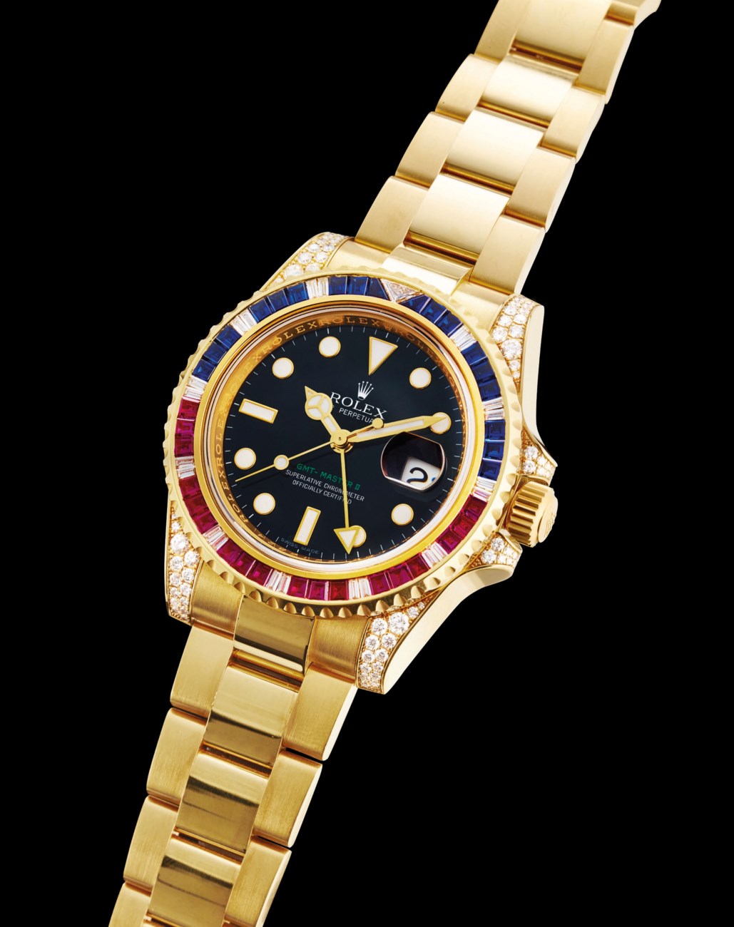 ROLEX. A FINE AND RARE 18K GOLD, DIAMOND, RUBY AND SAPPHIRE-SET ...