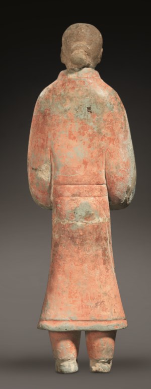A VERY RARE LARGE PAINTED GREY POTTERY FIGURE OF A FEMALE ATTENDANT
