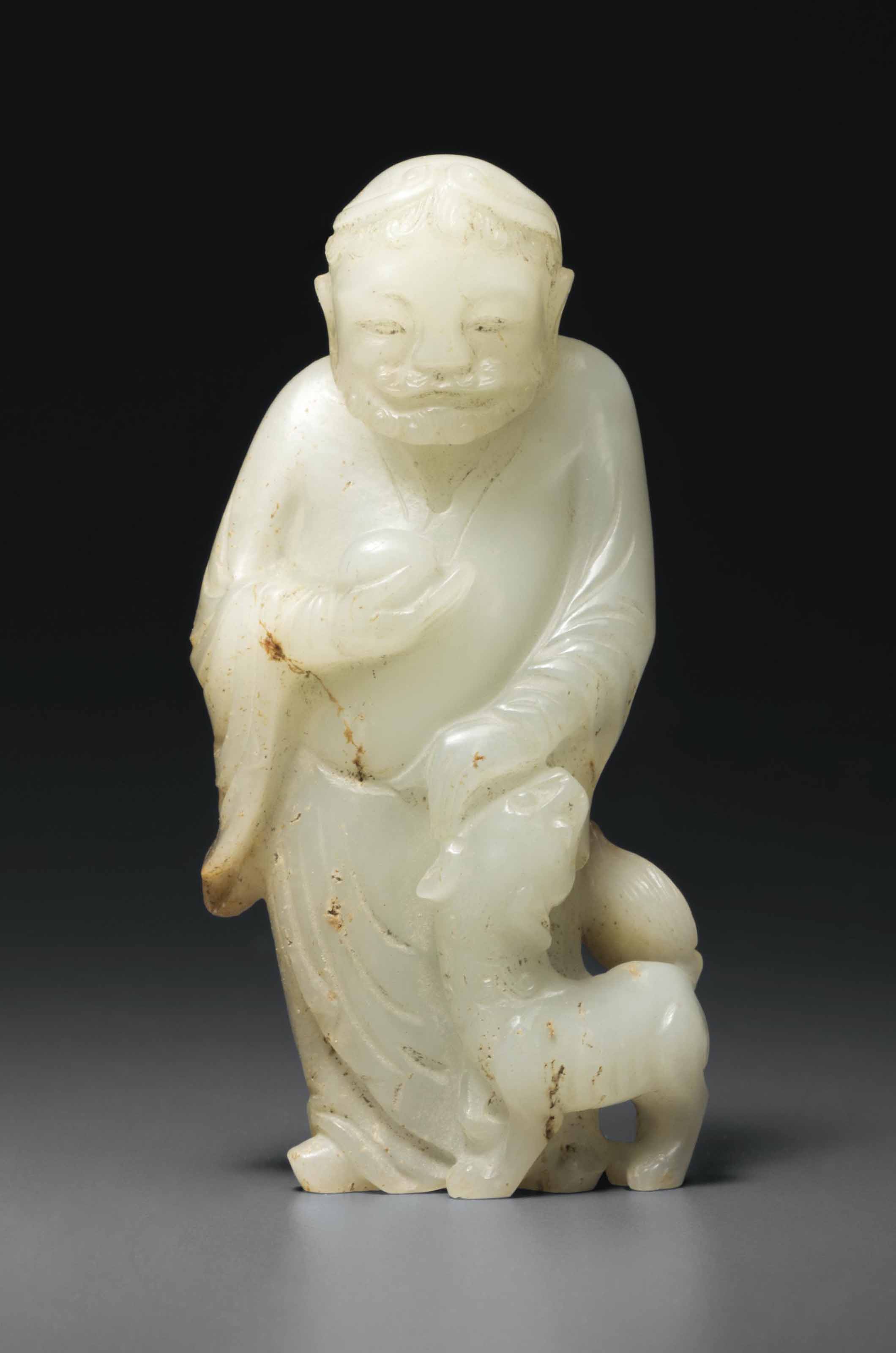 A YELLOW AND RUSSET JADE RECTANGULAR WEIGHT OR SEAL, CHINA, MING-EARLY ...