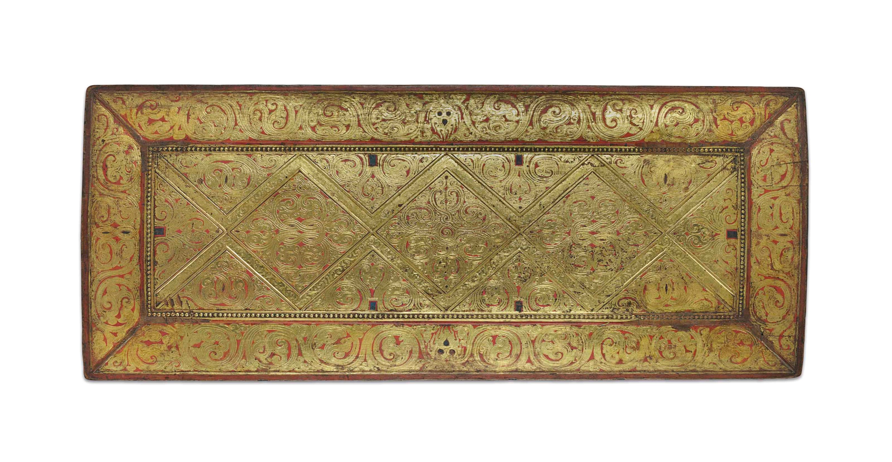 A carved, painted and gilt wooden manuscript cover, Tibet, 14th Century ...