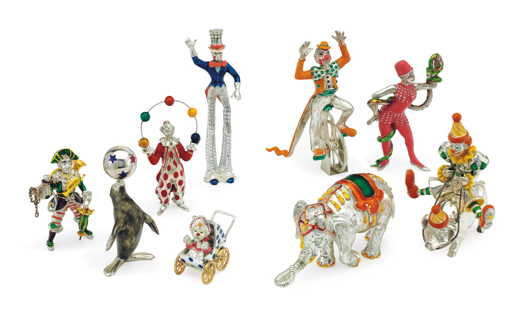 A GROUP OF SILVER AND ENAMEL CIRCUS FIGURINES, BY GENE MOORE, TIFFANY ...