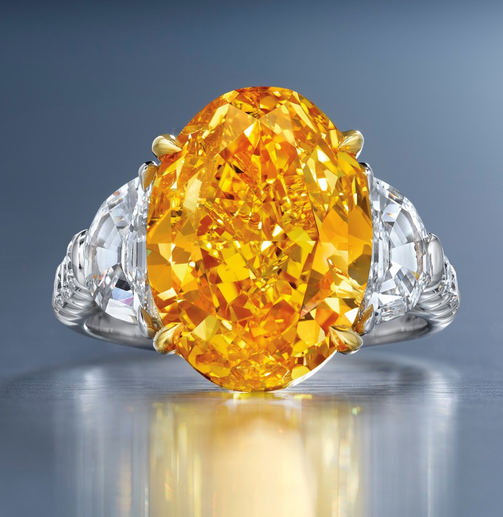 A RARE COLORED DIAMOND AND DIAMOND RING | Christie's