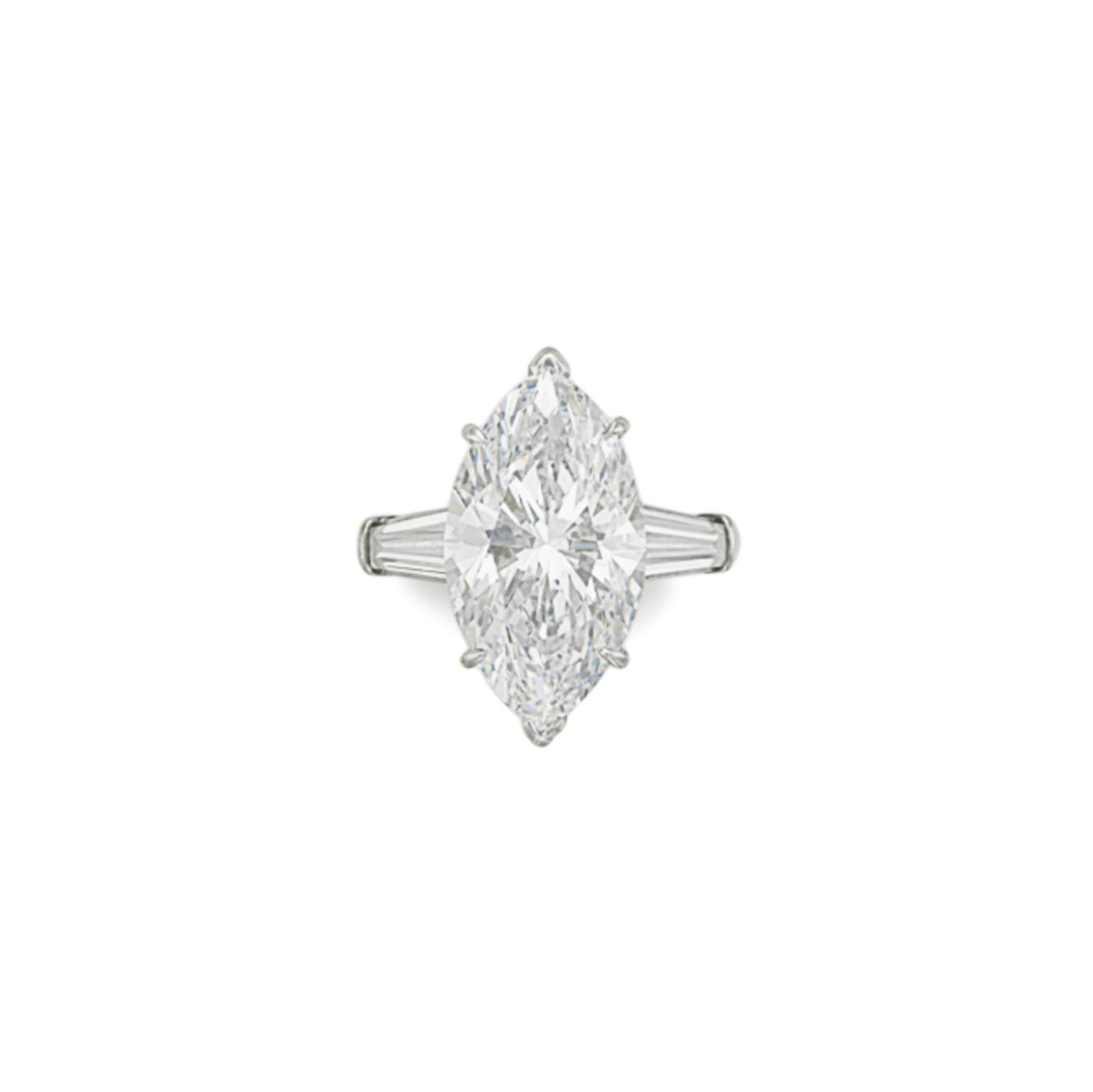 A RARE COLORED DIAMOND AND DIAMOND RING | Christie's