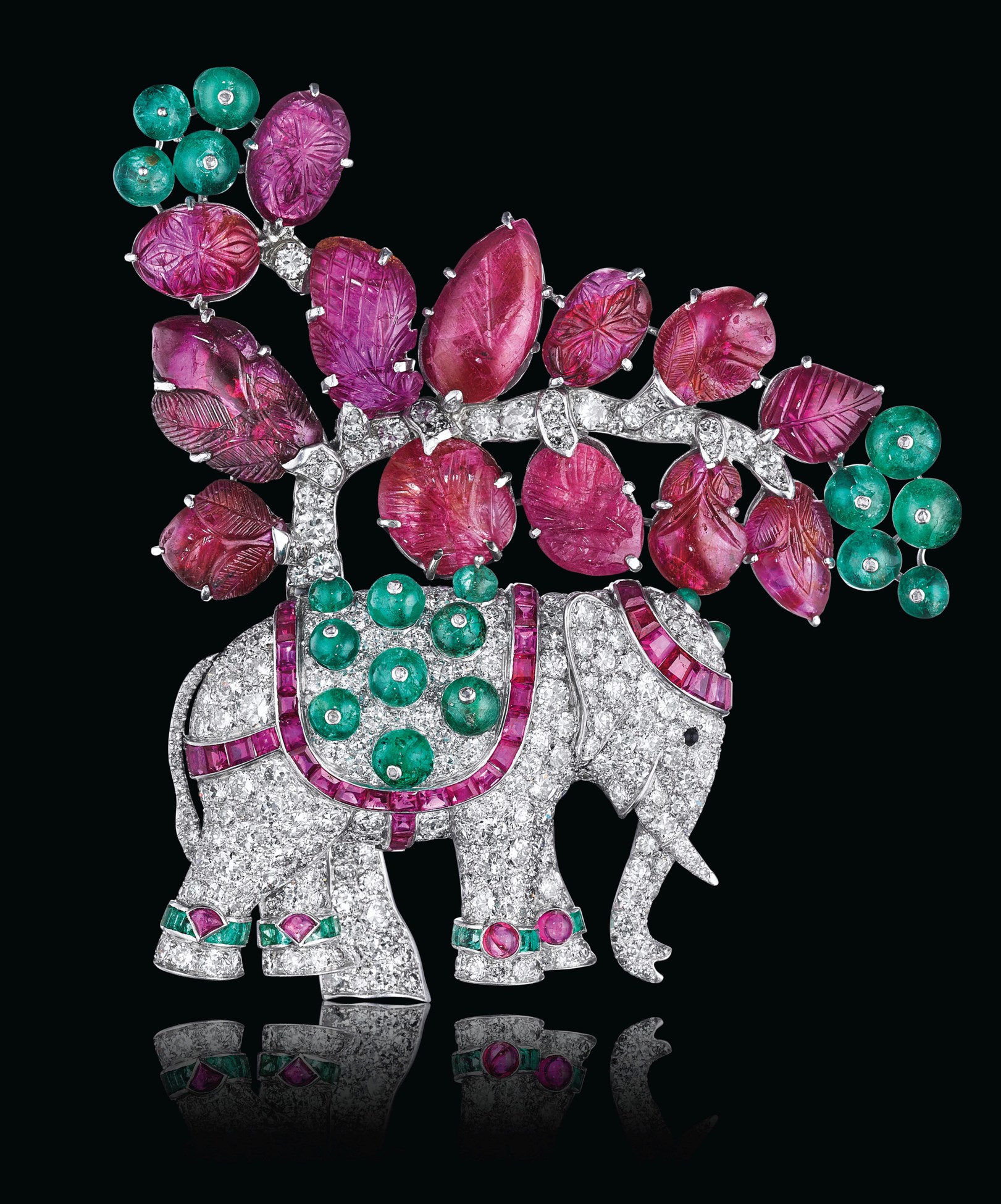 AN ART DECO RUBY, EMERALD AND DIAMOND ELEPHANT BROOCH, BY RENÉ BOIVIN ...