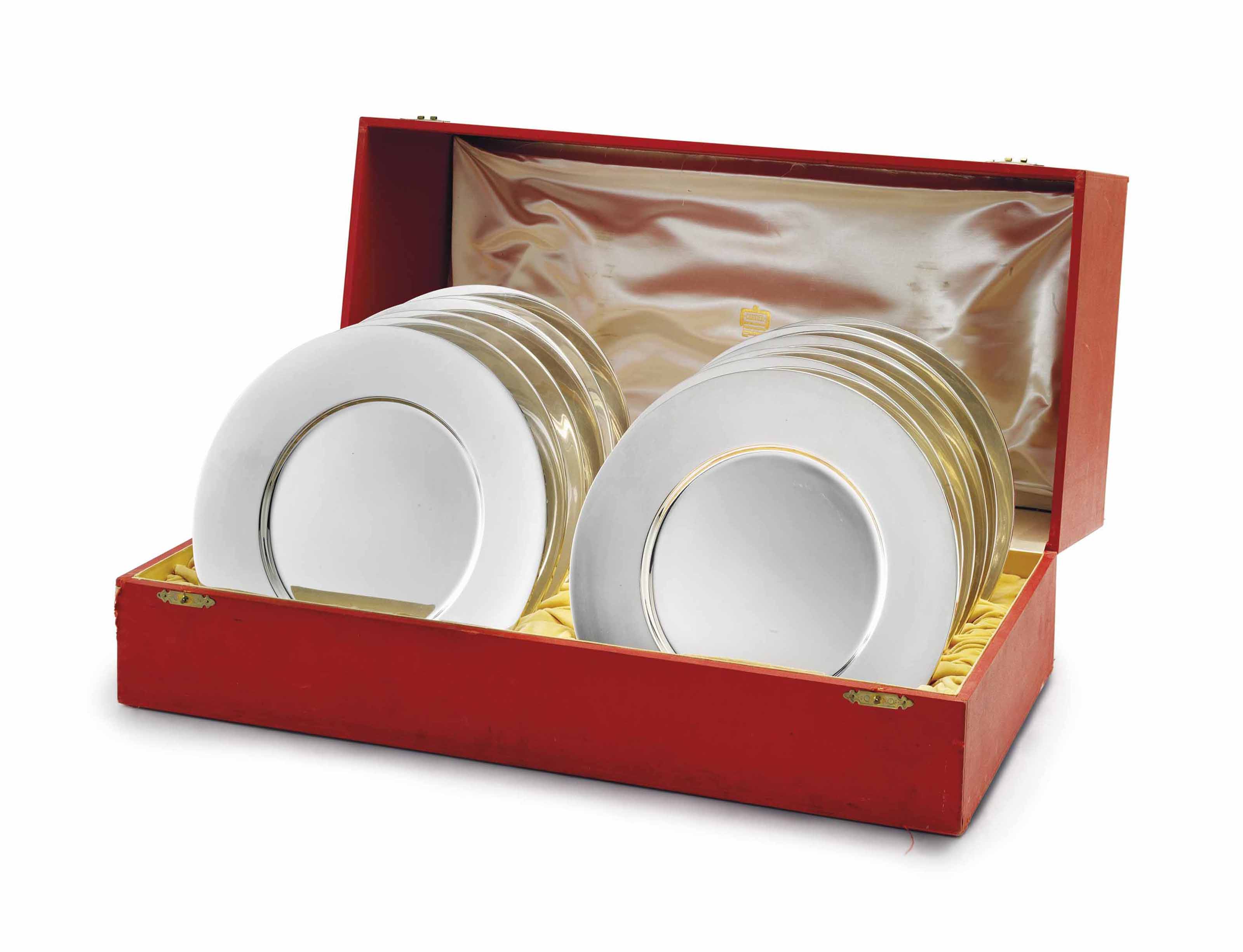 A SET OF TWELVE SILVER SERVICE PLATES