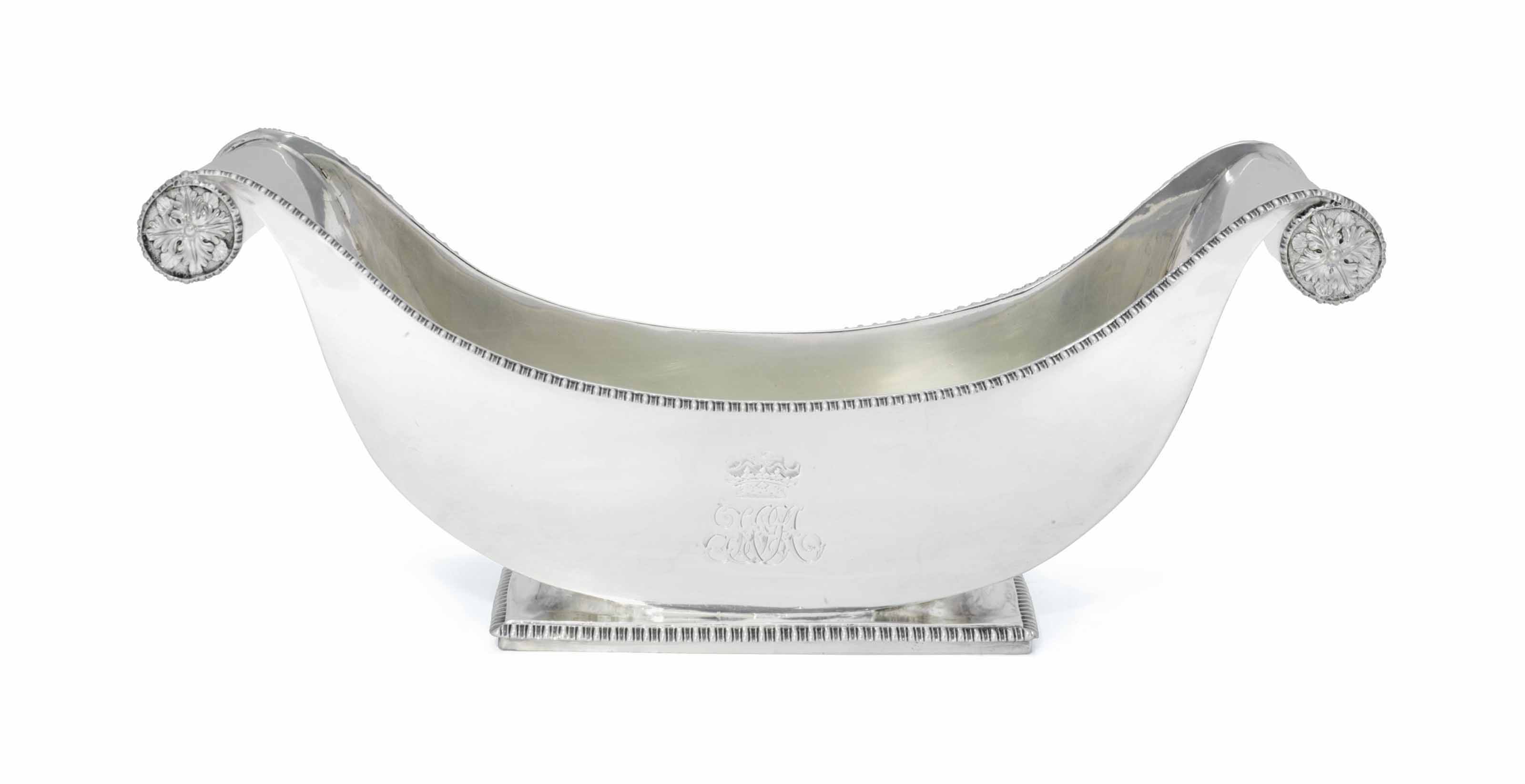 A REGENCY SILVER CHEESE CRADLE