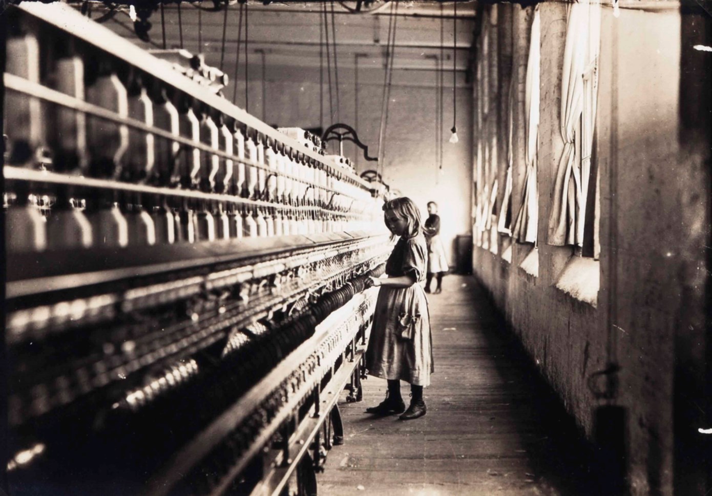 Lewis Wickes Hine (1874–1940), Girl working in a Carolina cotton mill ...