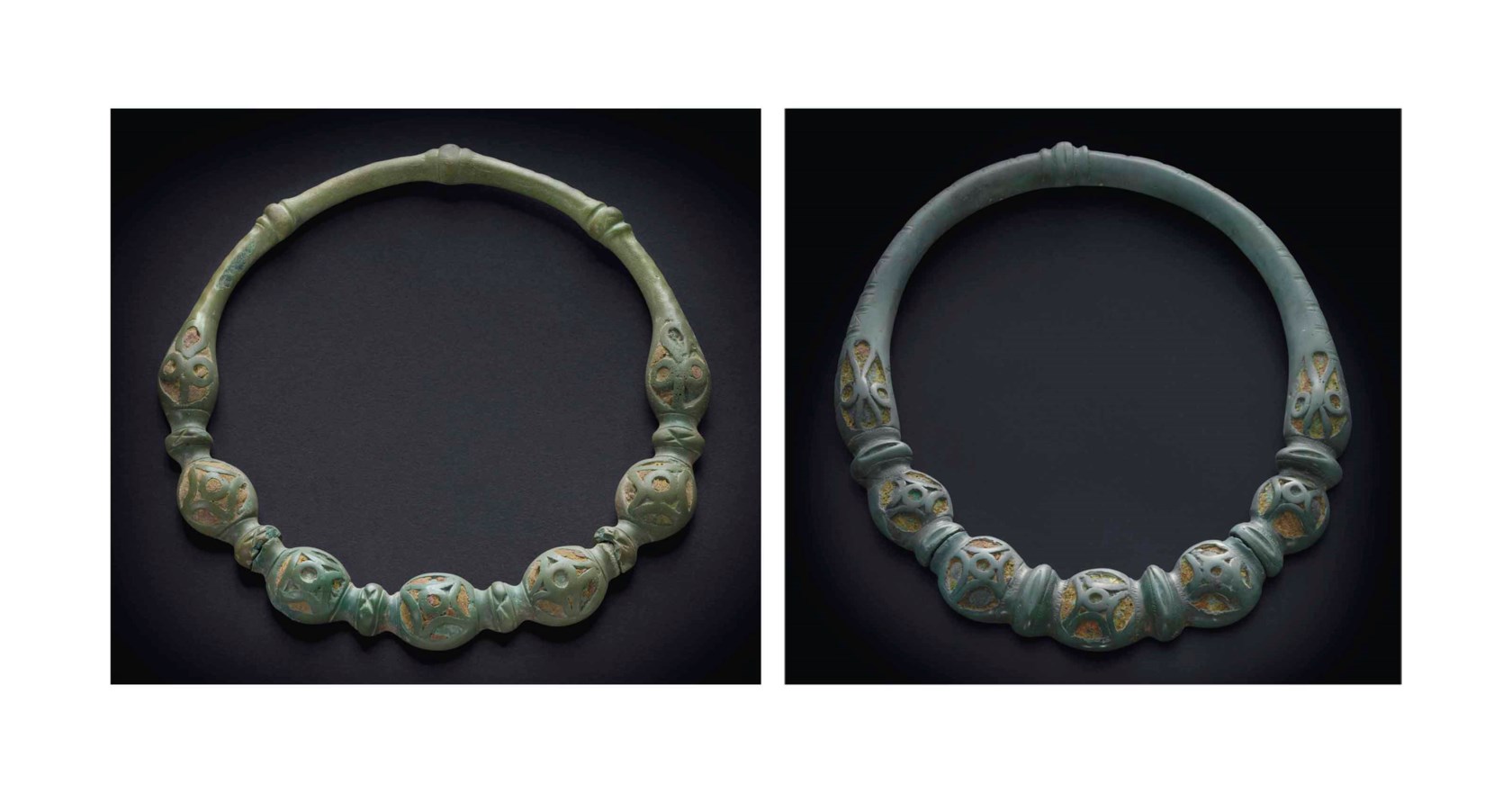 TWO CELTIC BRONZE TORQUES WITH INLAID ENAMEL