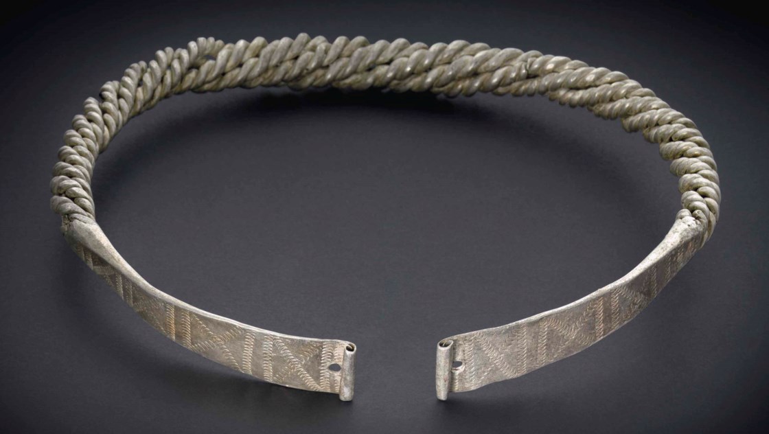 A VIKING SILVER BRAIDED TORQUE WITH INCISED TERMINALS, CIRCA 10TH-11TH ...