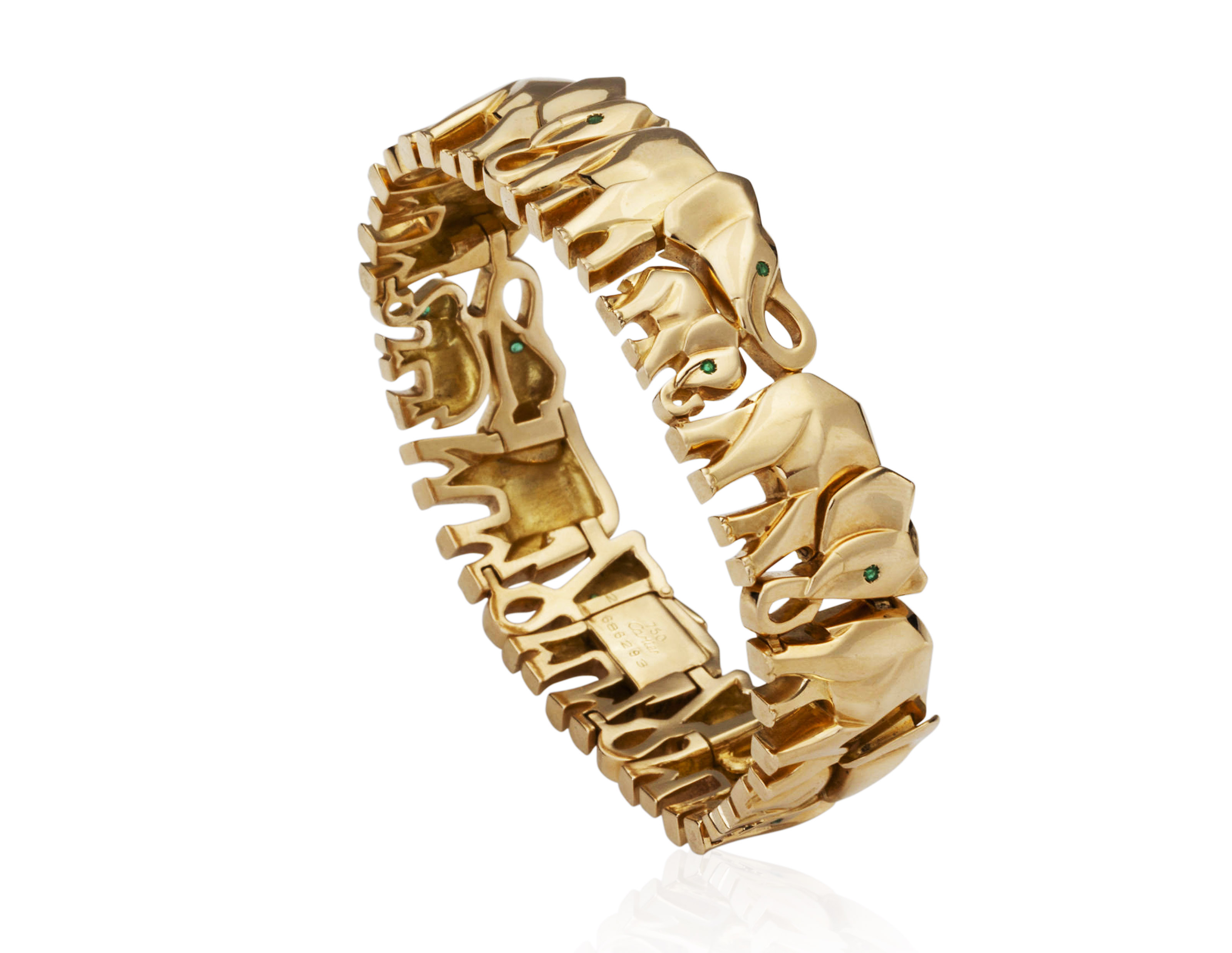 CARTIER GOLD AND EMERALD ELEPHANT BRACELET, | Christie’s