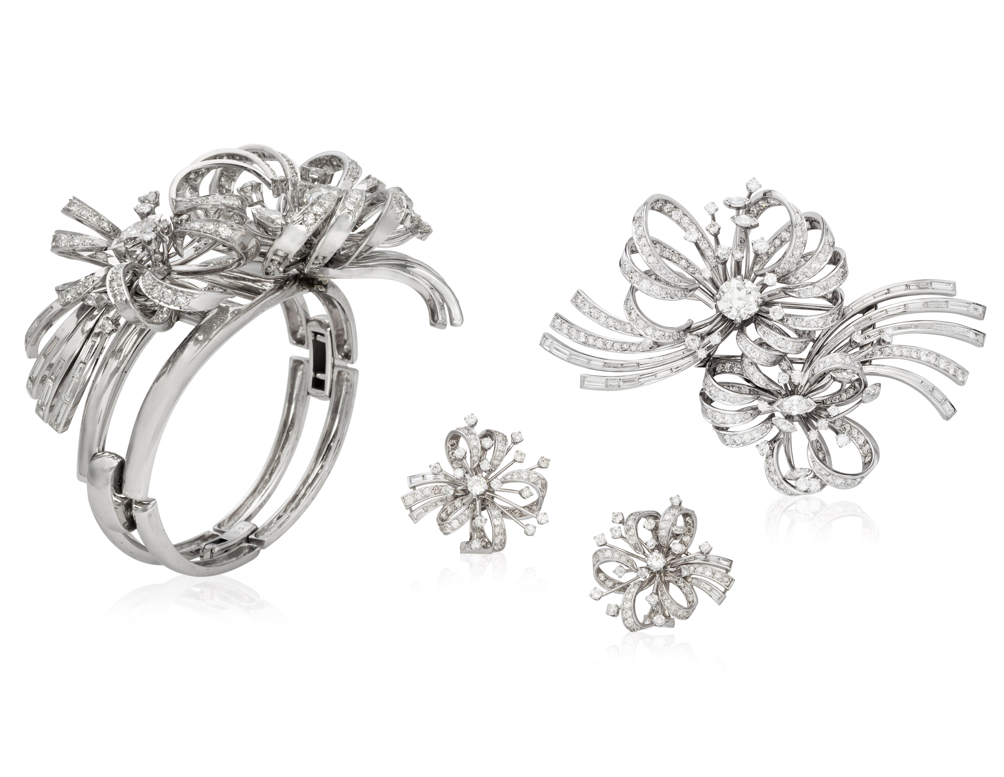 TRABERT & HOEFFER, MAUBOUSSIN RETRO 'REFLECTION' SUITE, | Christie’s