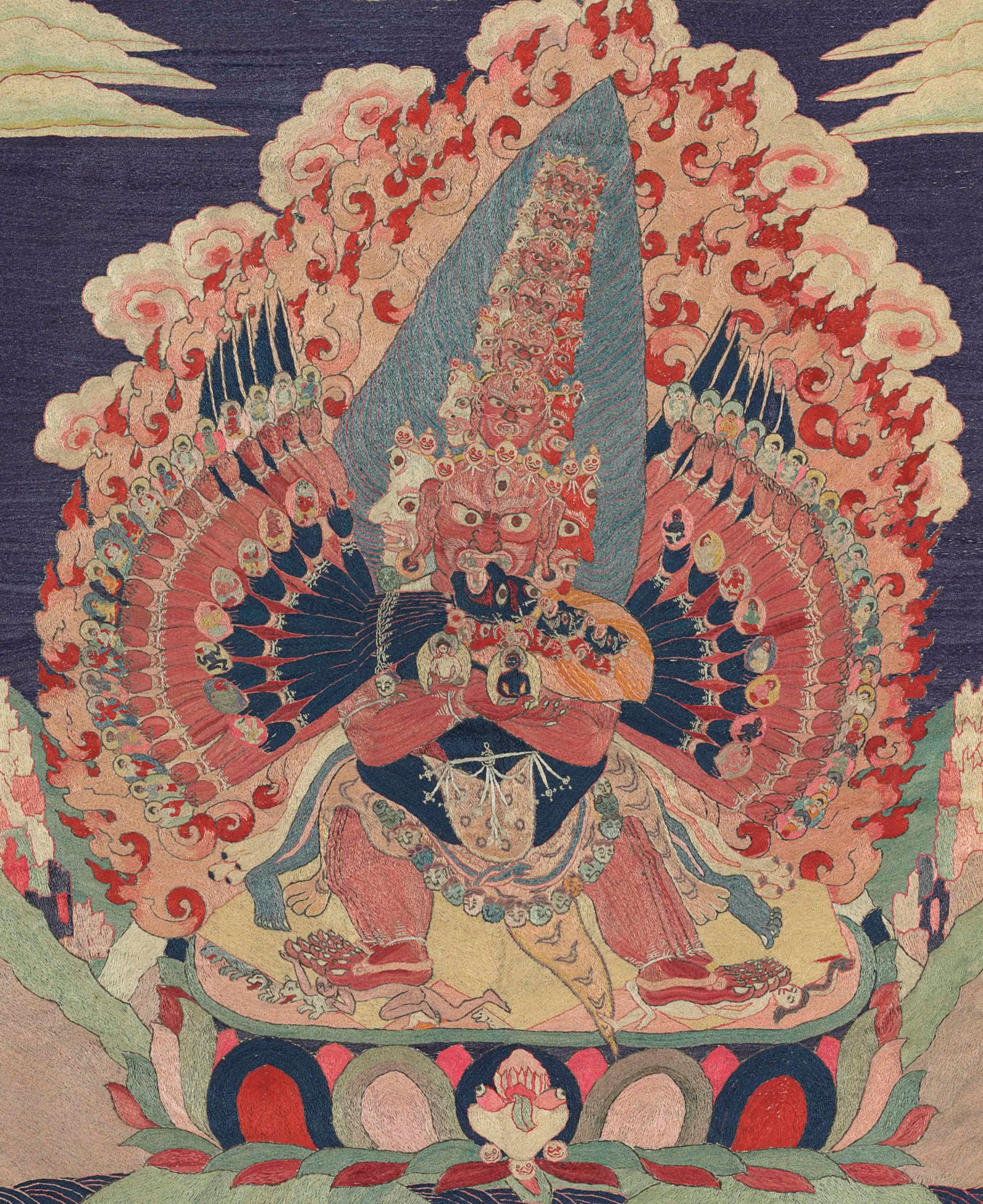 A SILK EMBROIDERED THANGKA OF MAHOTTARA HERUKA, TIBET, 19TH CENTURY ...
