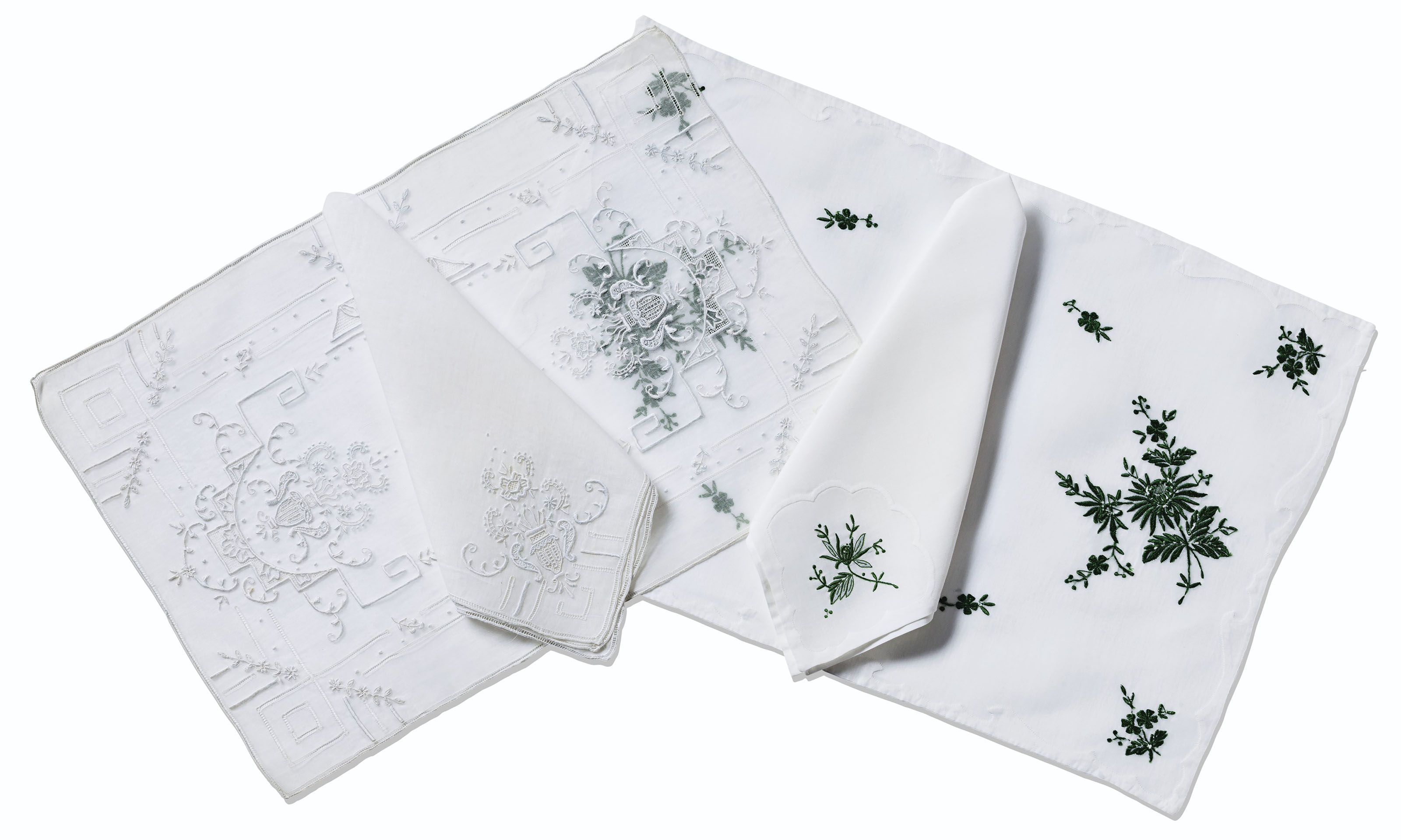 TWO SETS OF EMBROIDERED WHITE TABLE LINENS, | Christie’s