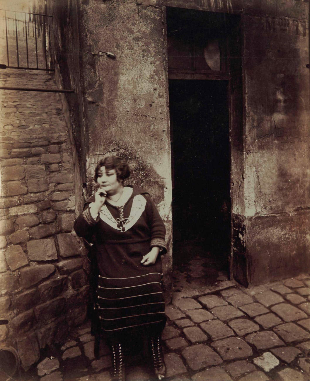 EUGÈNE ATGET (1857-1927), Rue Asselin, Paris, 1921 | Christie's