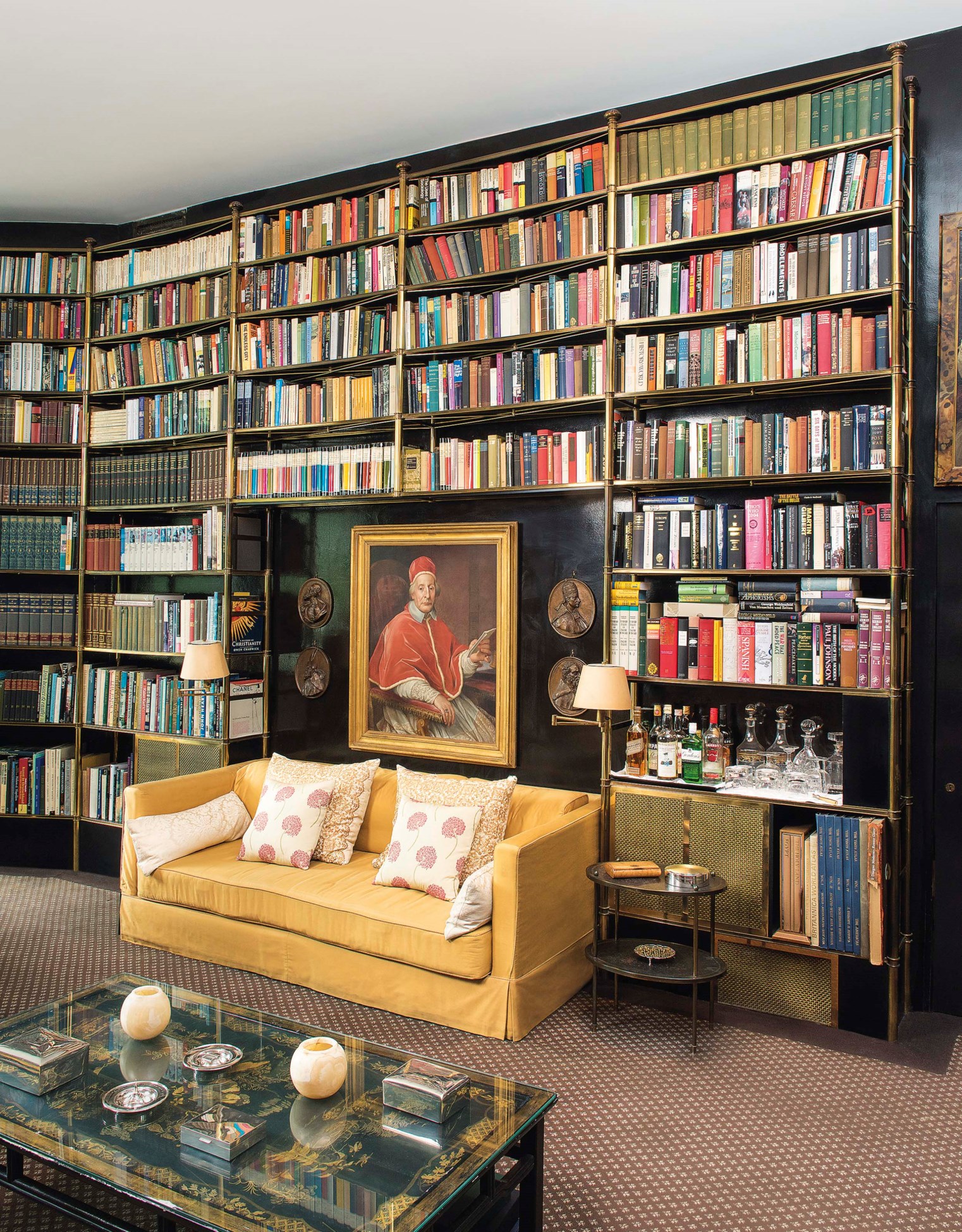 A LACQUERED-BRASS FIVE BAY BOOKCASE, DESIGNED AND SUPPLIED BY GEOFFREY ...
