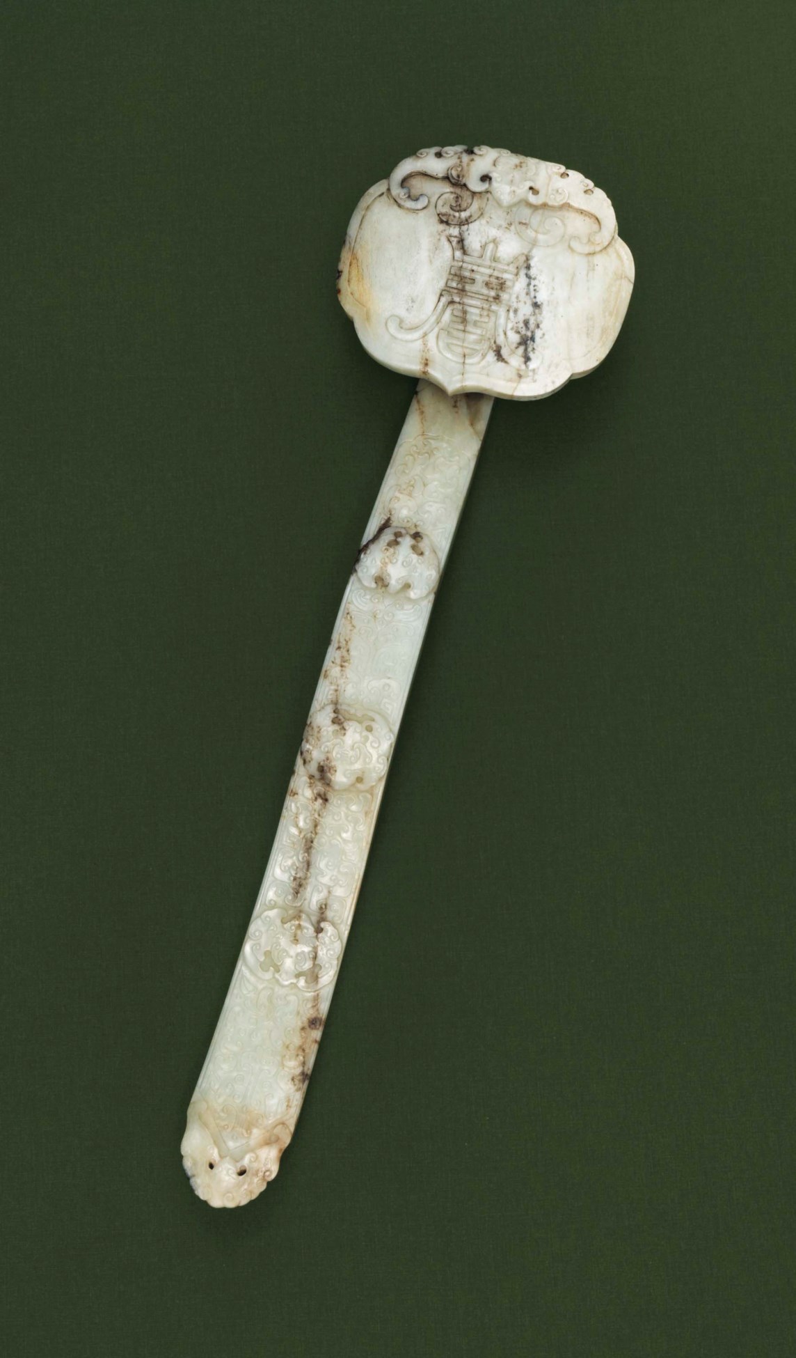 A CHICKEN-BONE JADE 'BATS' RUYI SCEPTRE, 18TH/19TH CENTURY | Christie's