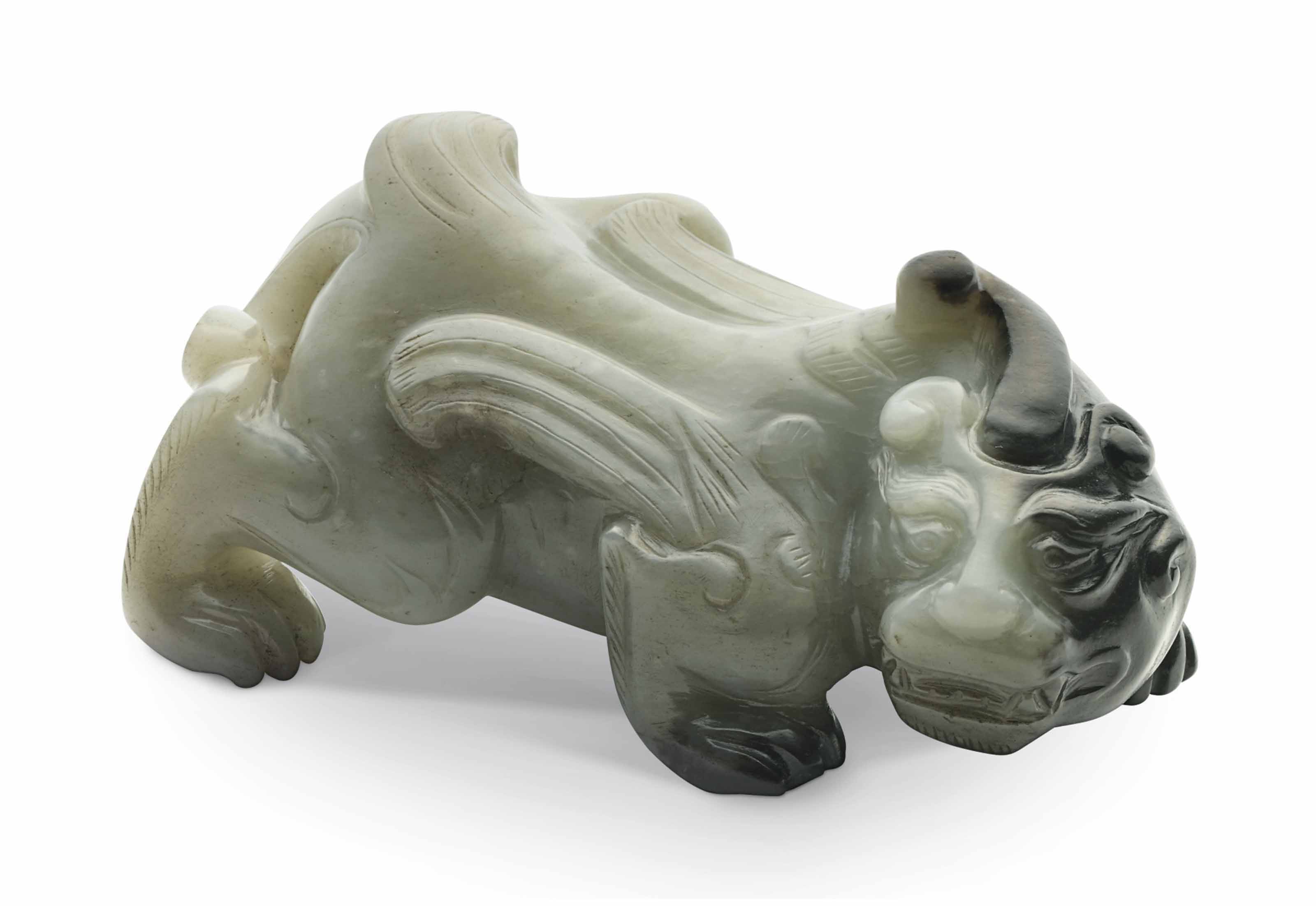 A TWO-COLOUR JADE CARVING OF A MYTHICAL BEAST, BIXIE