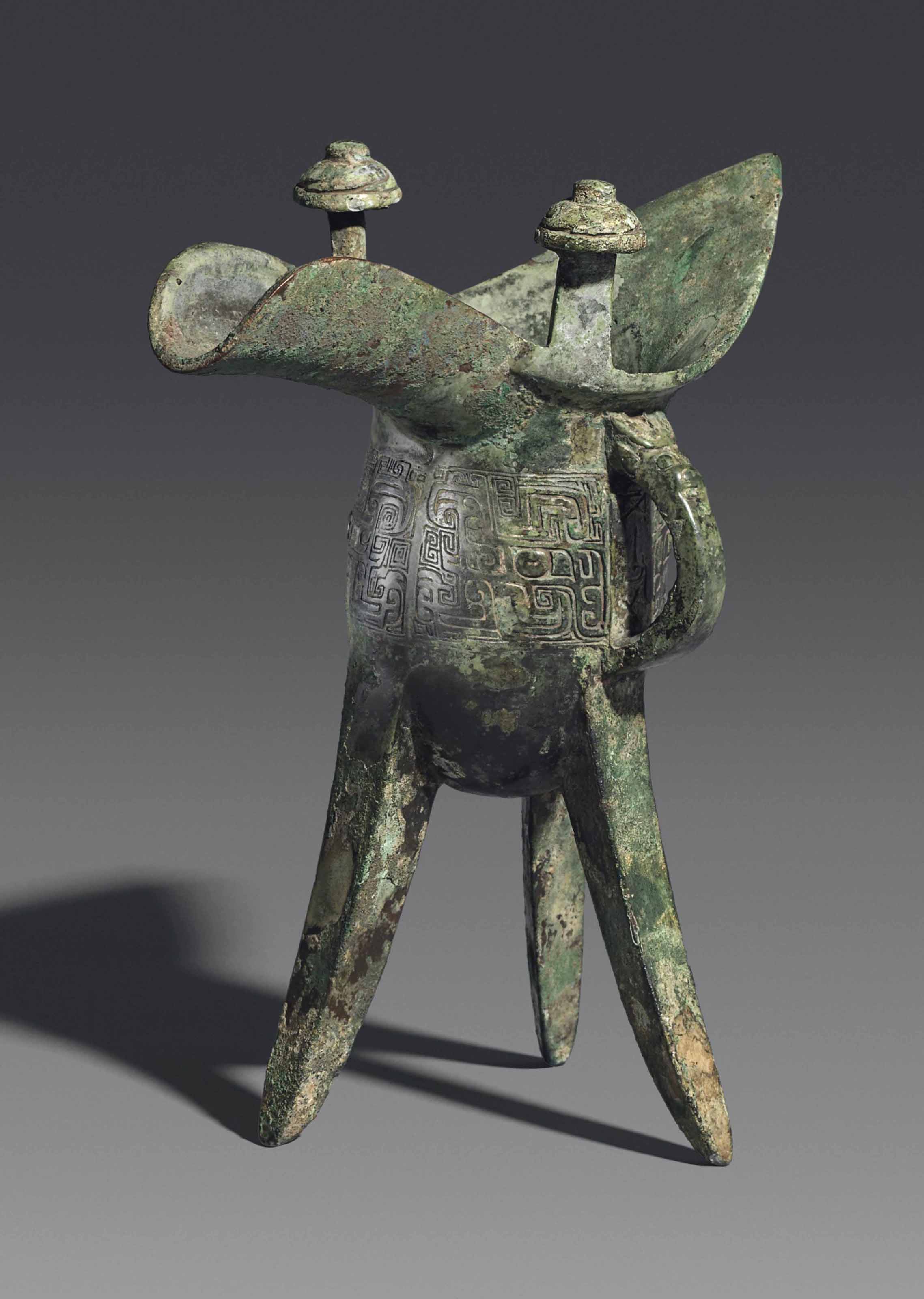 A BRONZE RITUAL WINE VESSEL, JUE , SHANG DYNASTY (1600-1100 BC ...