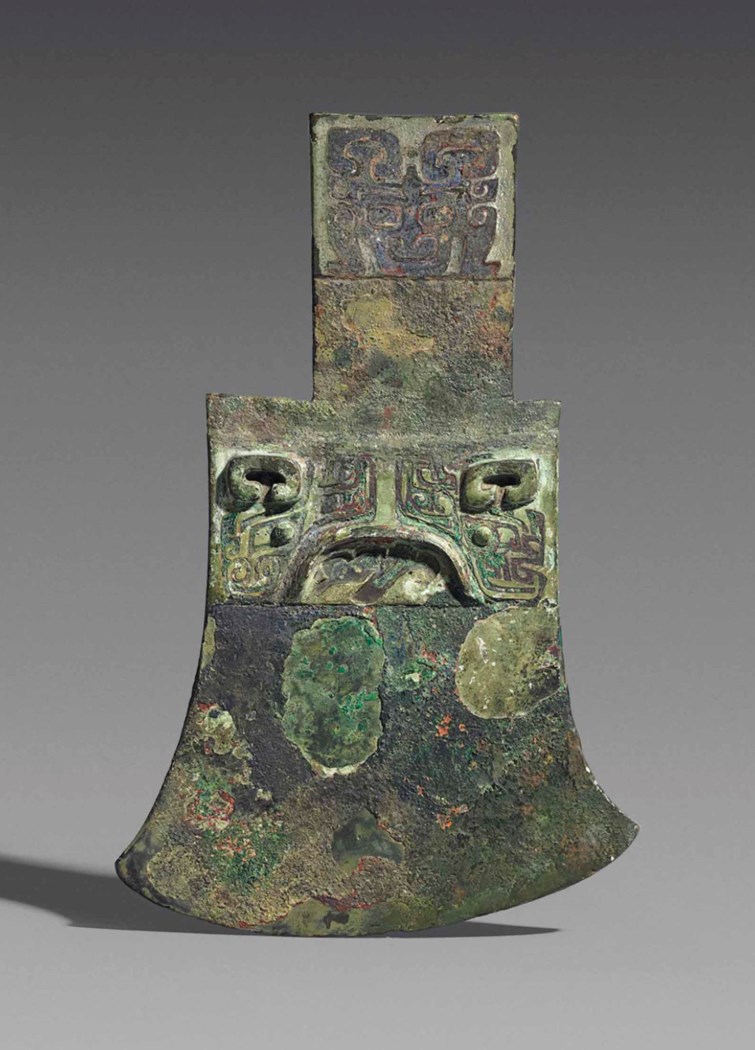 A BRONZE AXE HEAD, SHANG DYNASTY (1600-1100 BC) | Christie's