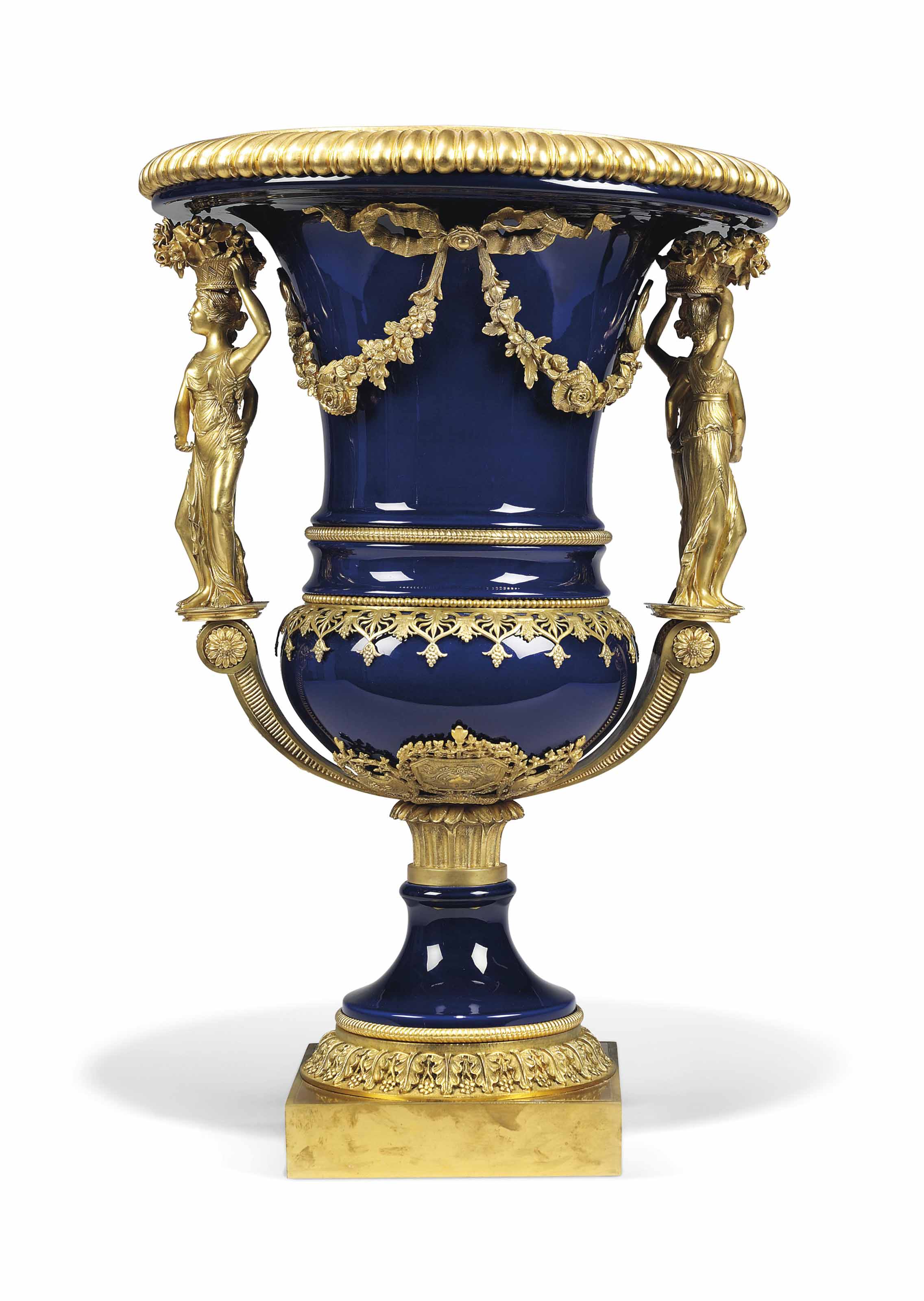 AN ITALIAN LAPIS LAZULI, SODALITE AND WHITE-METAL SURTOUT-DE-TABLE ...