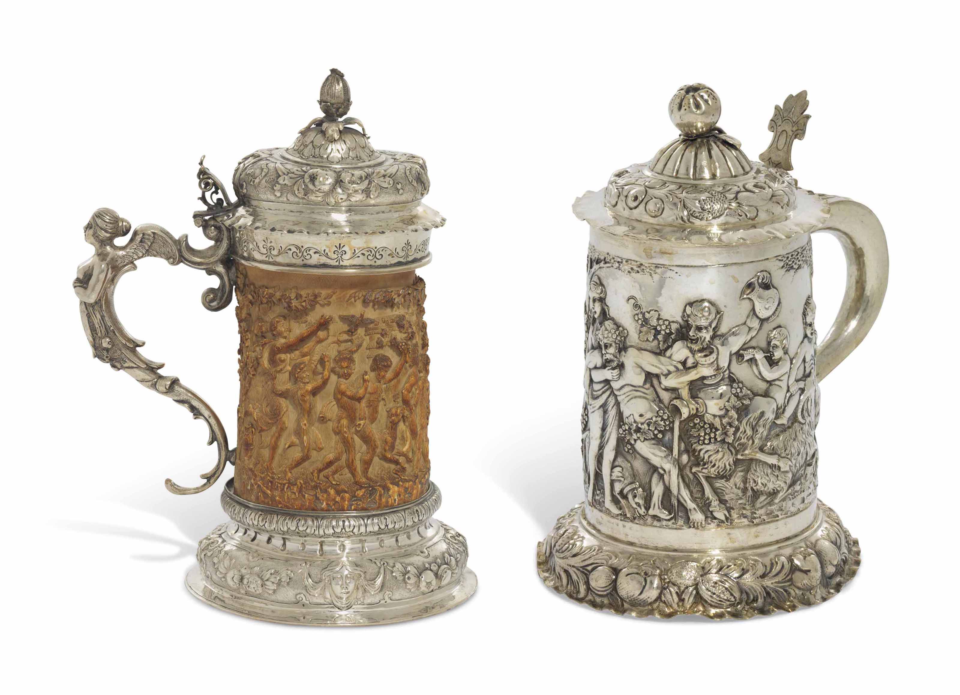 A GERMAN SILVER-MOUNTED CARVED IVORY TANKARD, APPARENTLY UNMARKED, 19TH ...