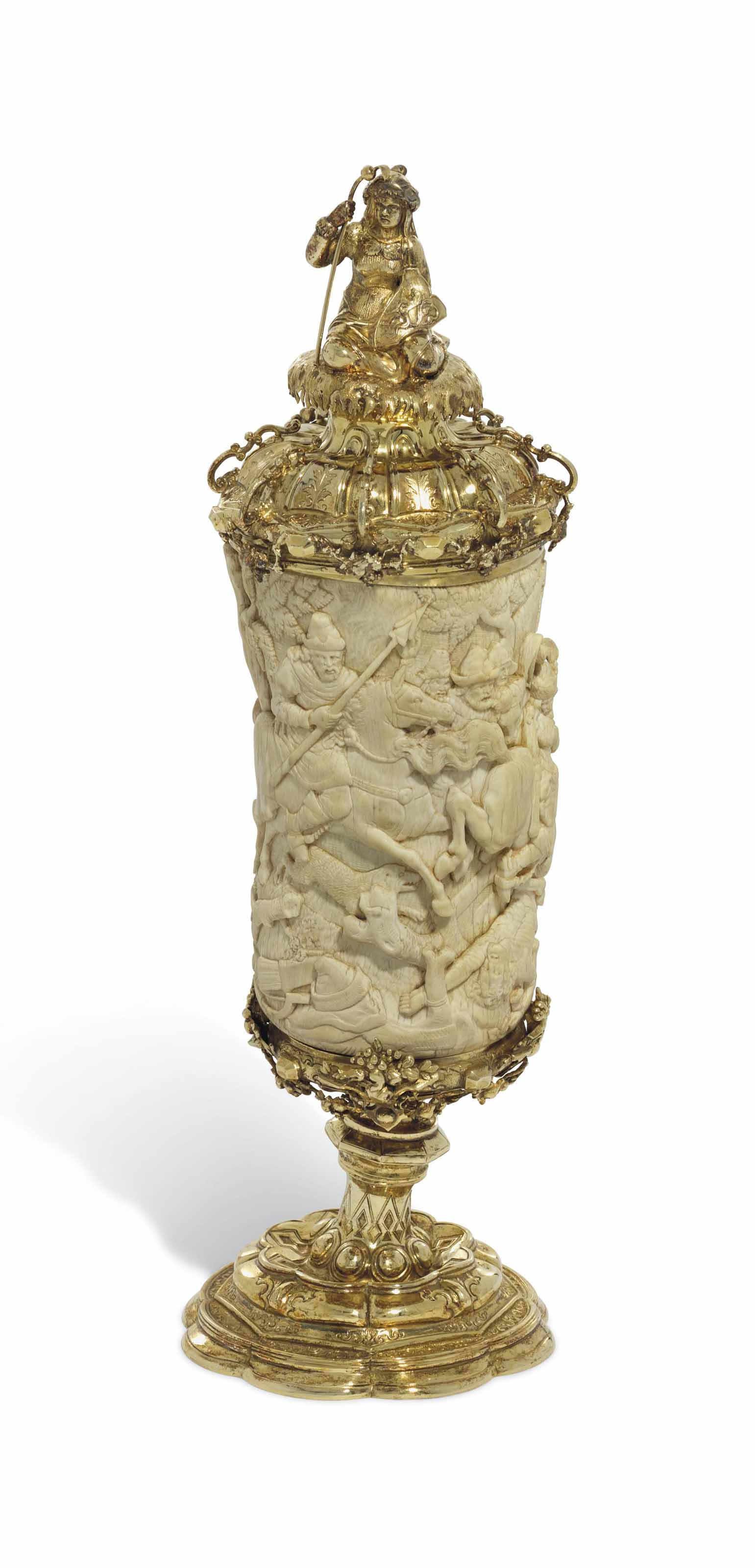 A GERMAN SILVER-GILT-MOUNTED CARVED IVORY TANKARD, APPARENTLY UNMARKED ...