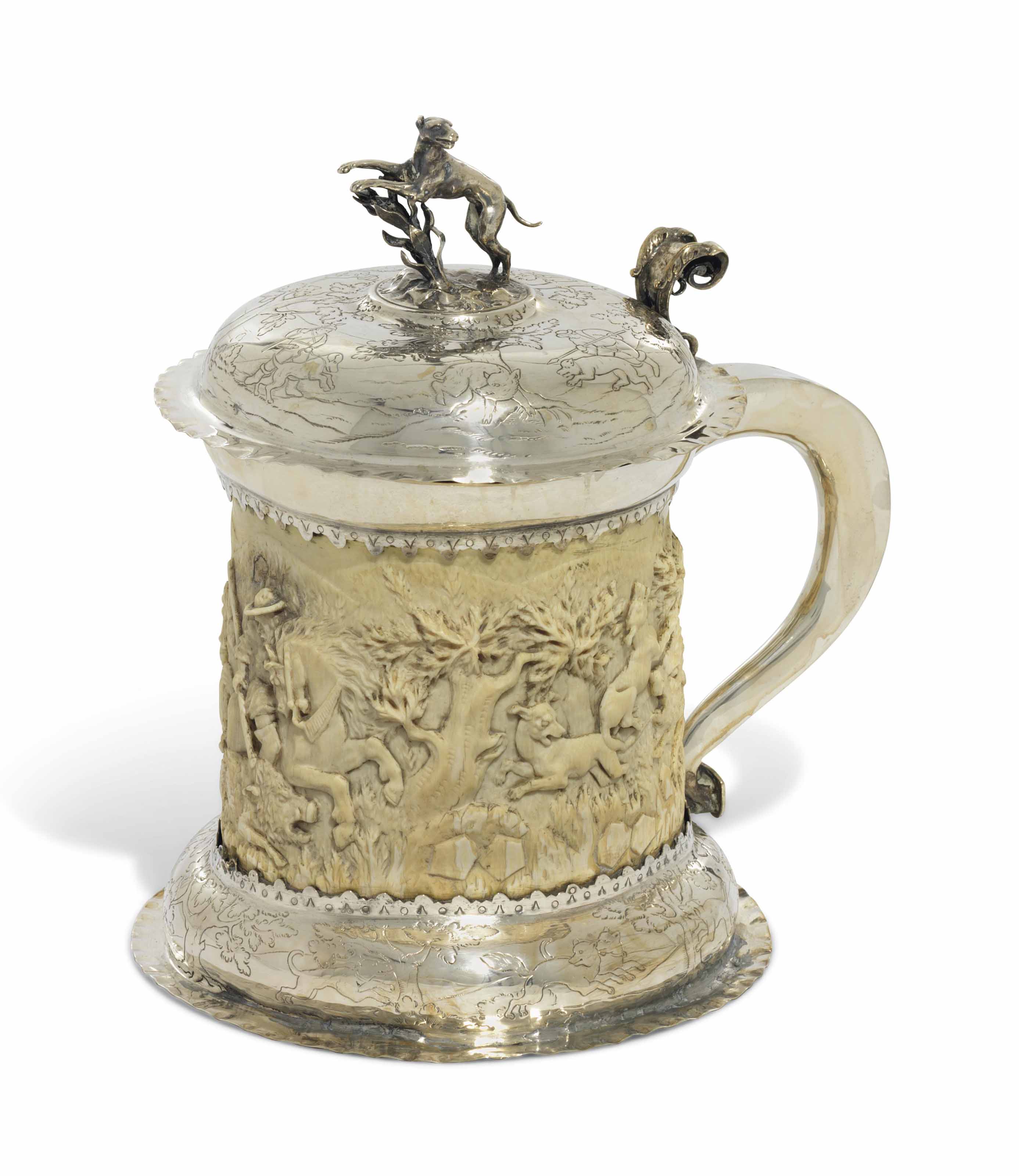 A GERMAN SILVER-GILT-MOUNTED CARVED IVORY TANKARD, APPARENTLY UNMARKED ...