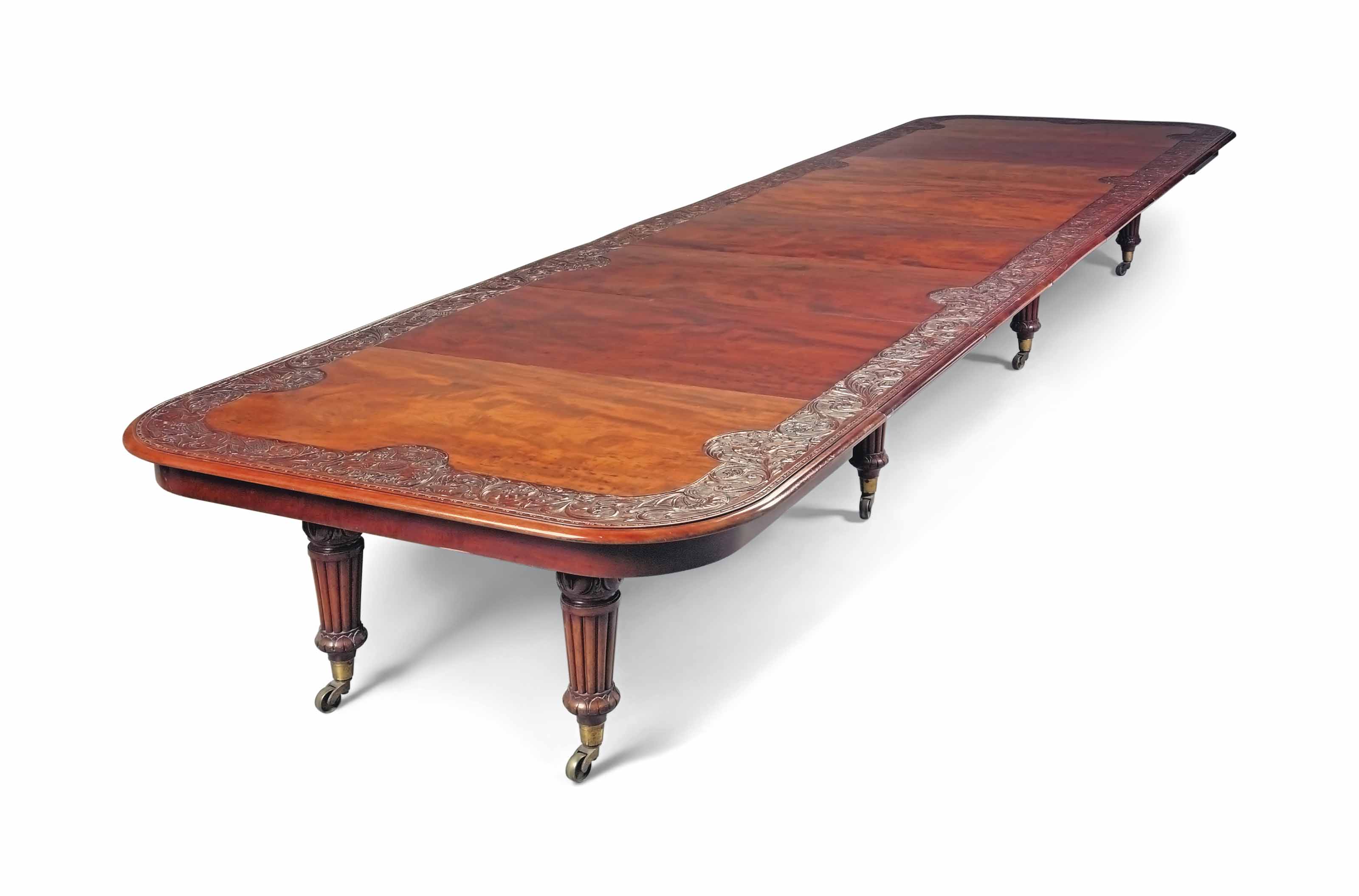 AN EARLY VICTORIAN MAHOGANY EXTENDING DINING TABLE , BY HOLLAND & SONS ...