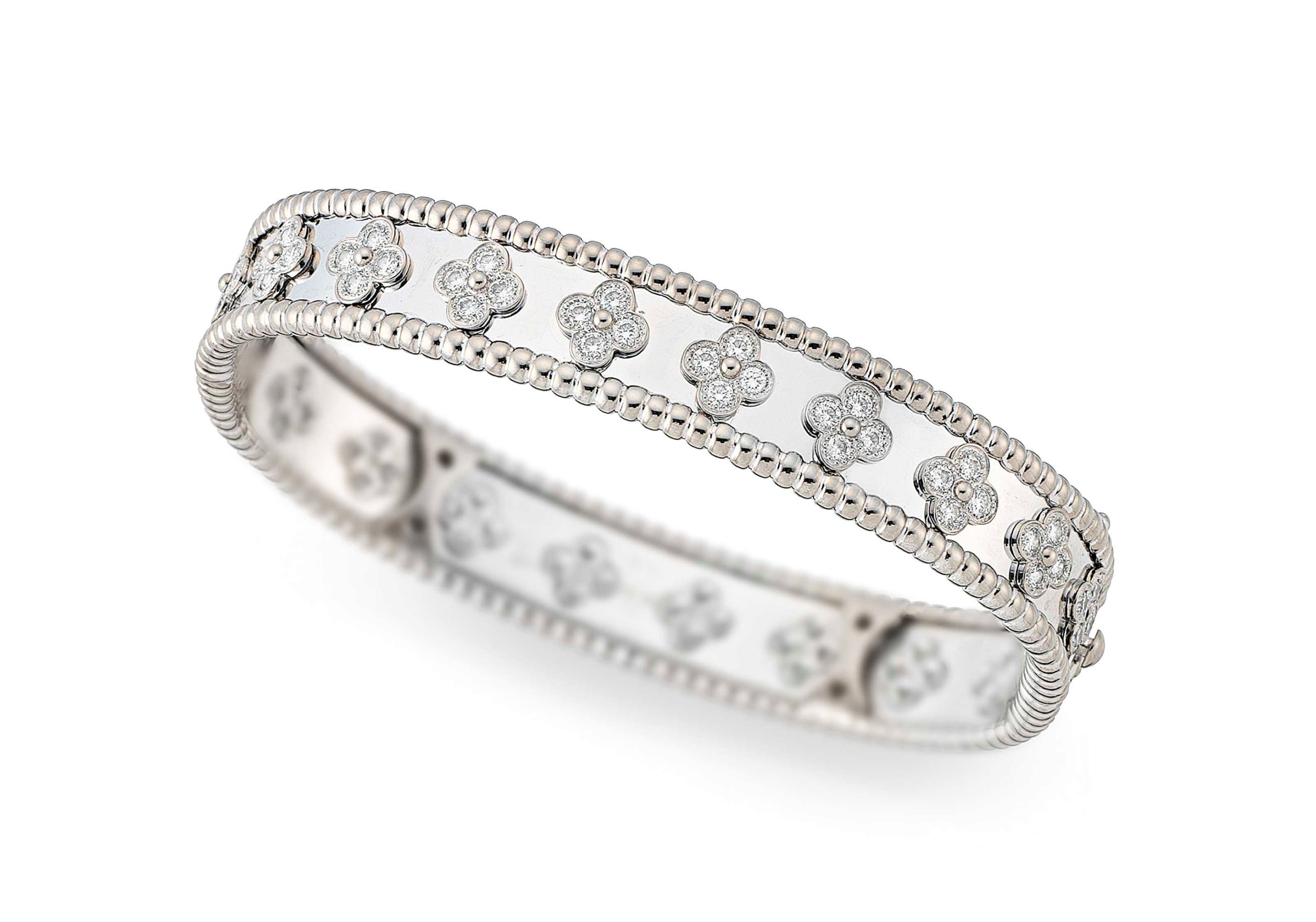 A DIAMOND-SET 'PERLÉE CLOVER' BANGLE, BY VAN CLEEF & ARPELS | Christie's