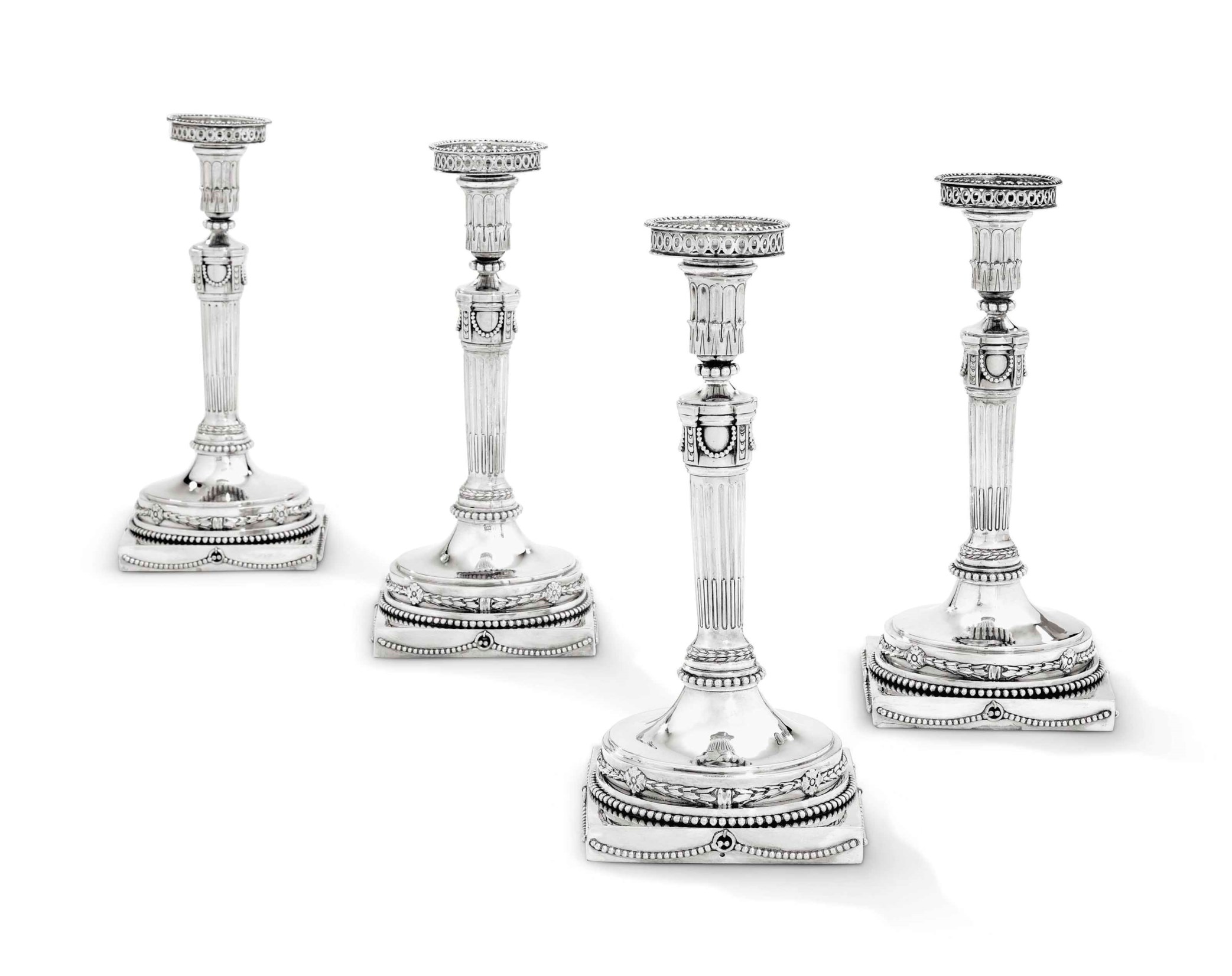 A SET OF FOUR DUTCH SILVER CANDLESTICKS, MARK OF RUDOLPH SONDAG ...