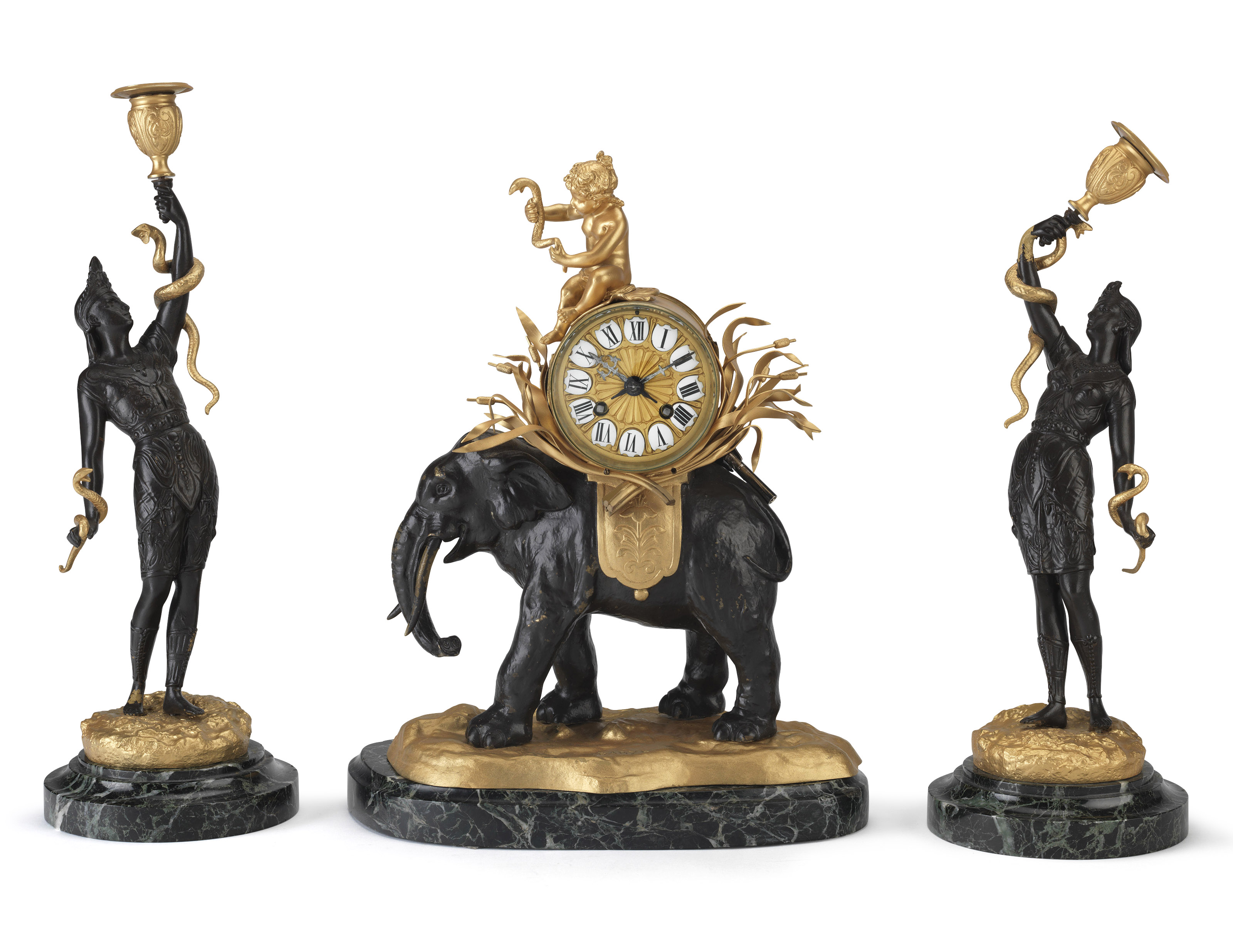 ELEPHANT CLOCK WITH TWO CANDELABRA, | Christie’s