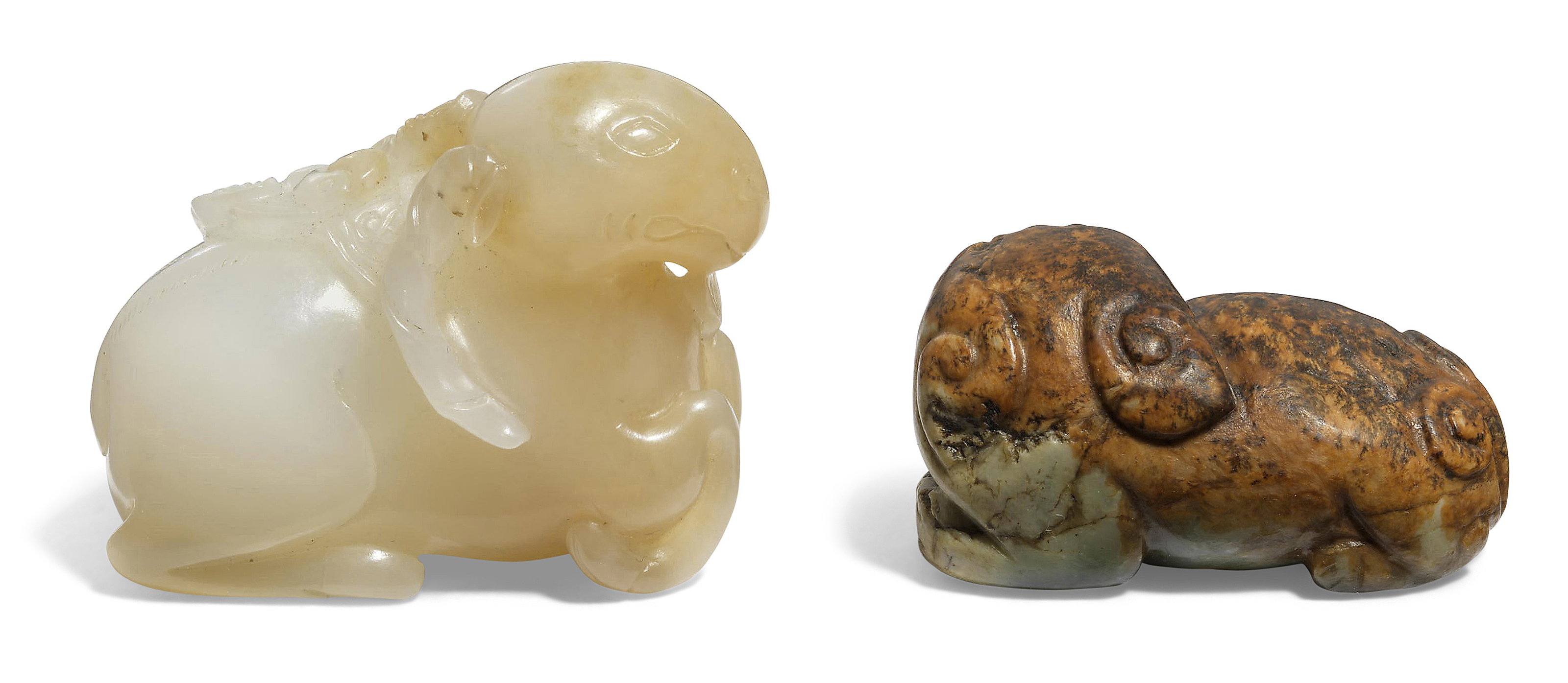 A SMALL MING CELADON AND RUSSET JADE DOG AND A SMALL WHITE AND RUSSET ...