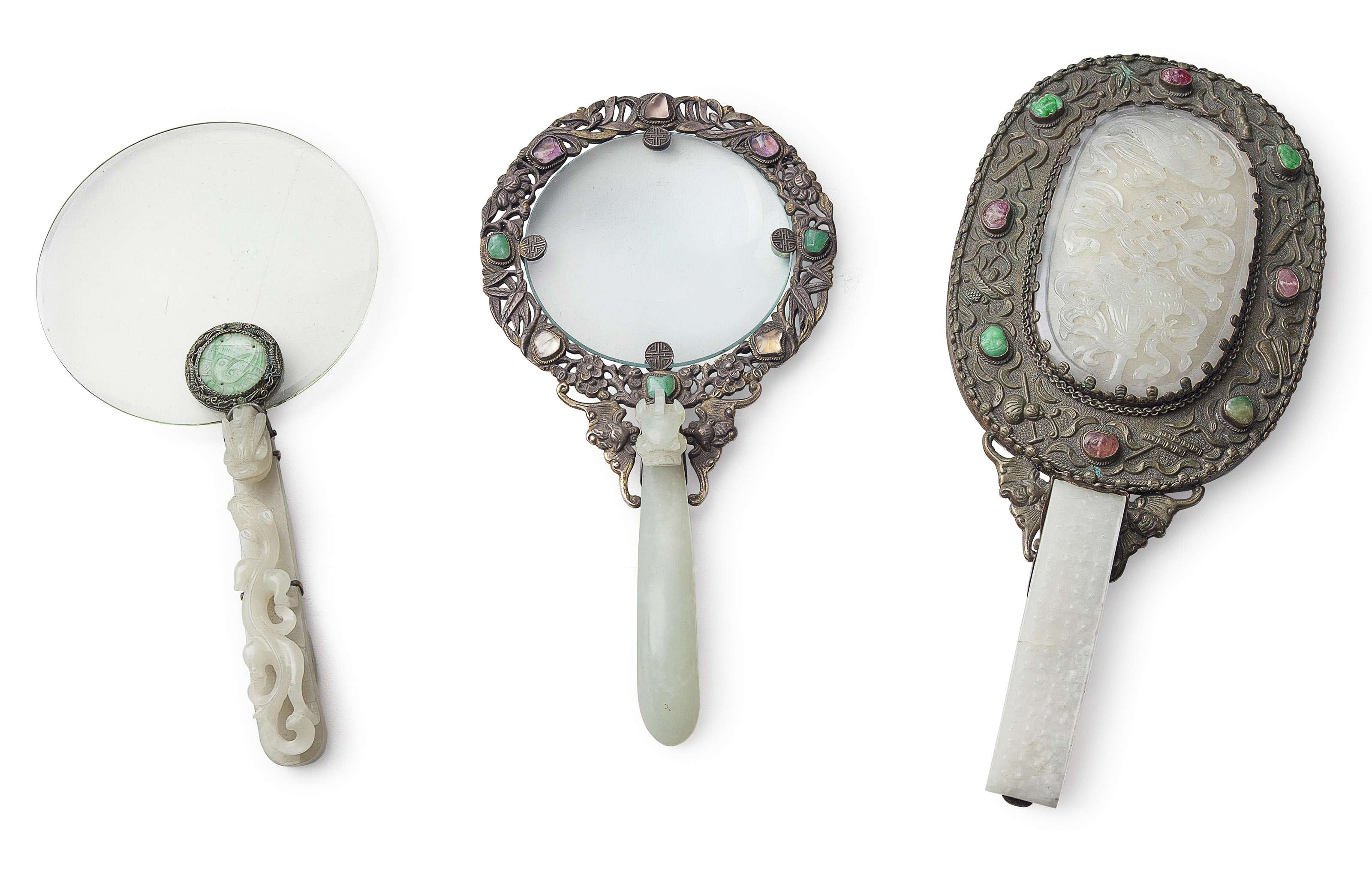 TWO JADE-MOUNTED MAGNIFYING GLASSES AND A JADE AND SILVER-MOUNTED HAND ...