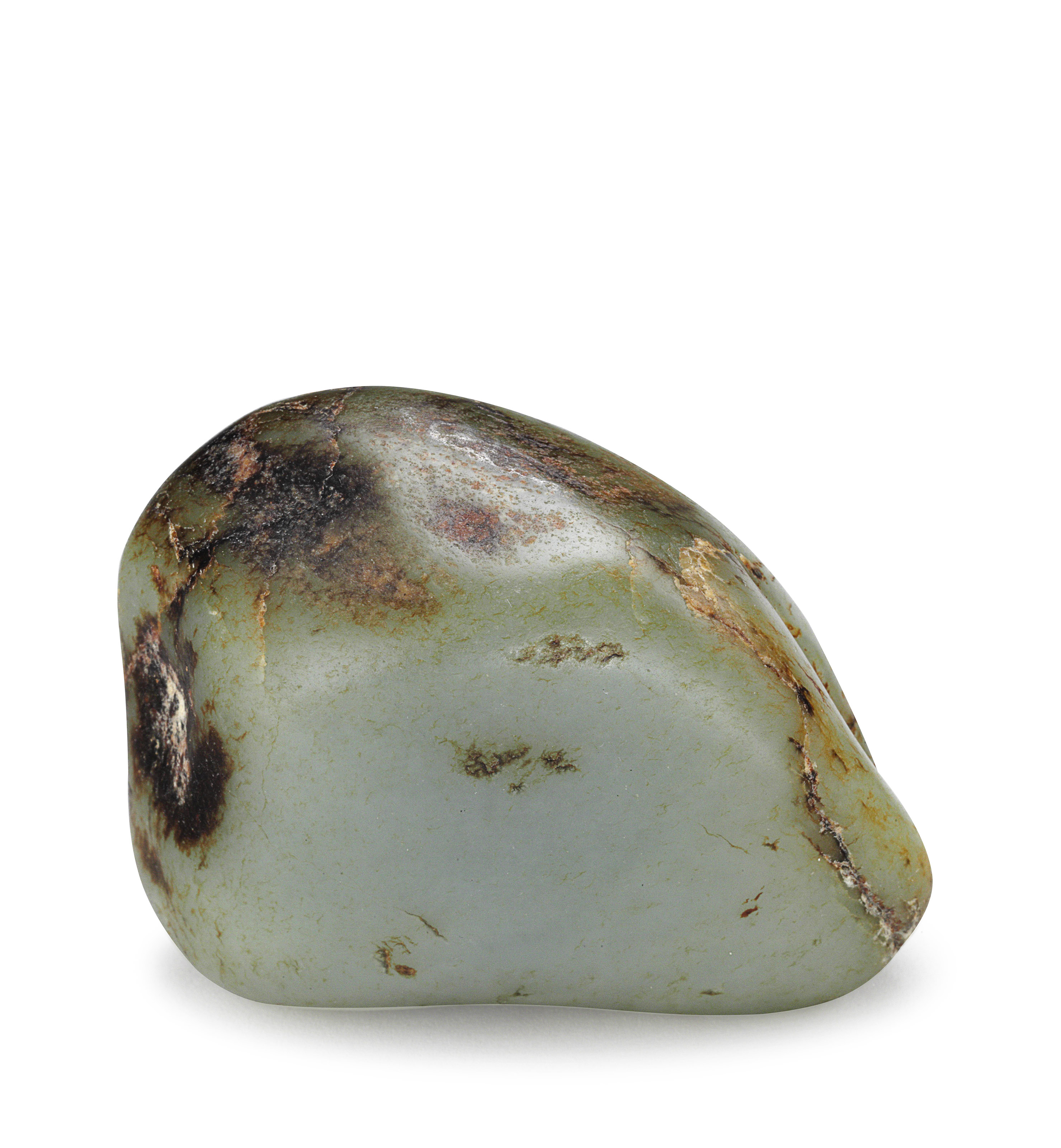 A GREEN AND RUSSET JADE PEBBLE, | Christie’s