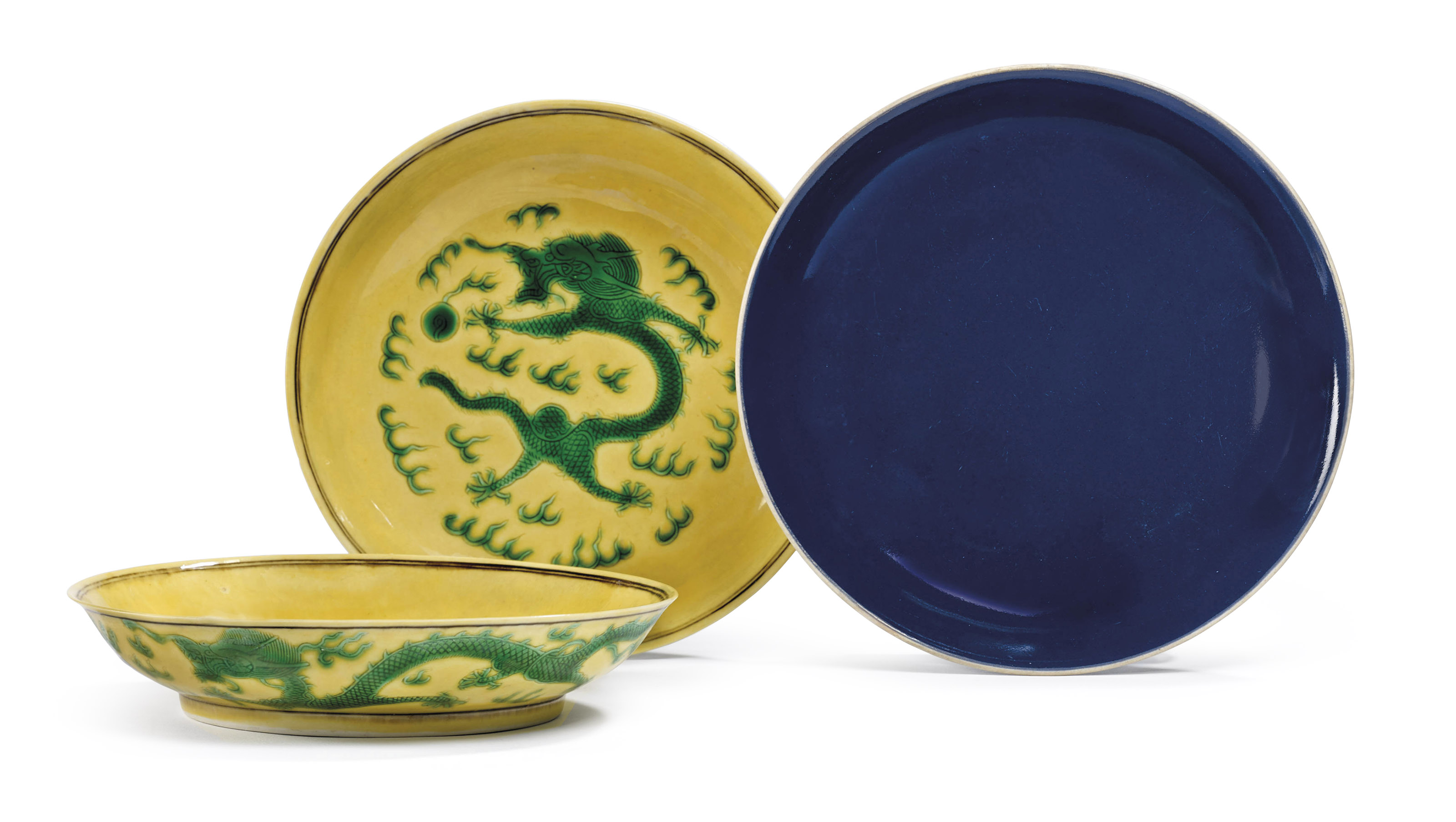 A PAIR OF YELLOW-GROUND GREEN-ENAMELLED 'DRAGON' DISHES AND A BLUE ...