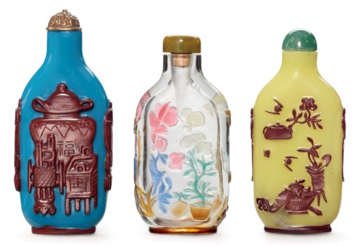 THREE CARVED OVERLAY GLASS SNUFF BOTTLES, 1800-1900 | Christie’s
